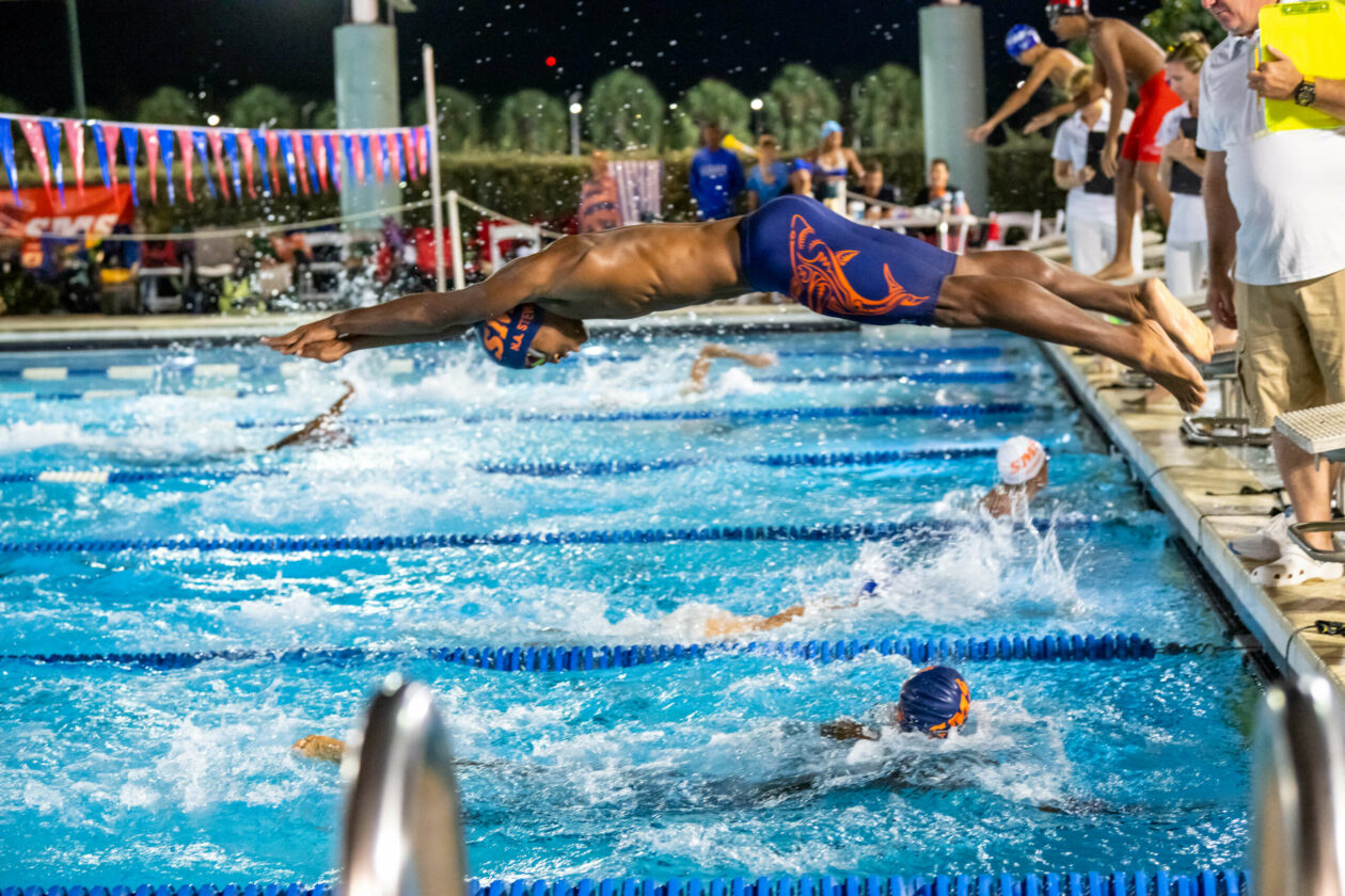 Crooks and Broadbelt shine at national swimming championships - Cayman ...