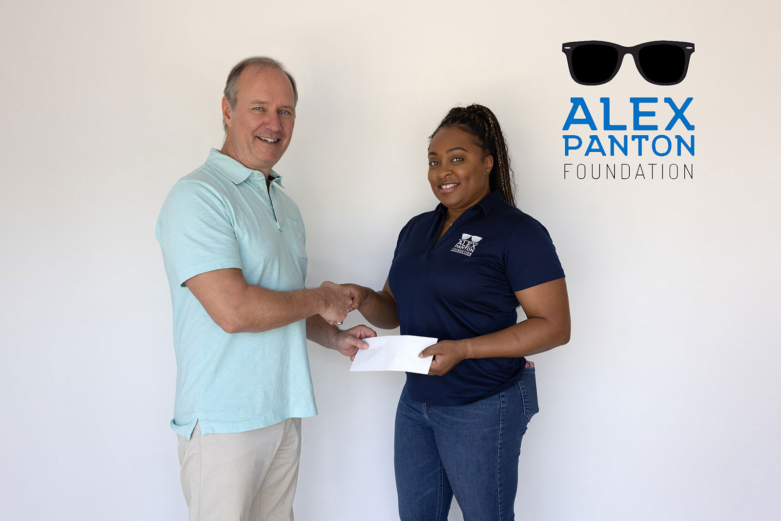 IMG raises $10,000 for four local charities - Cayman Compass