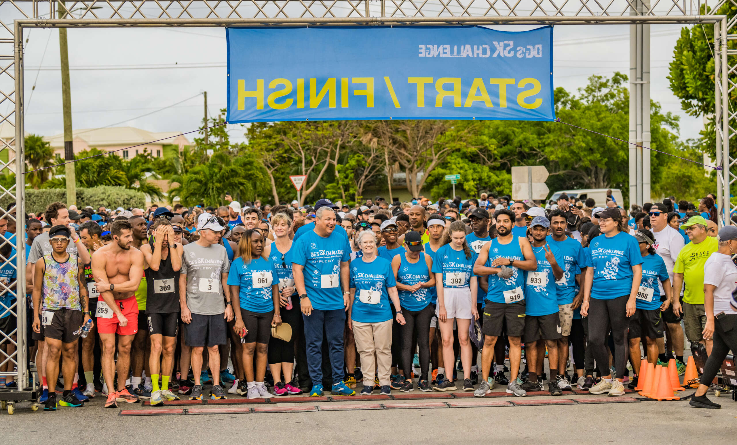 DG encourages exercise as hundreds hit the road for annual 5k - Cayman ...