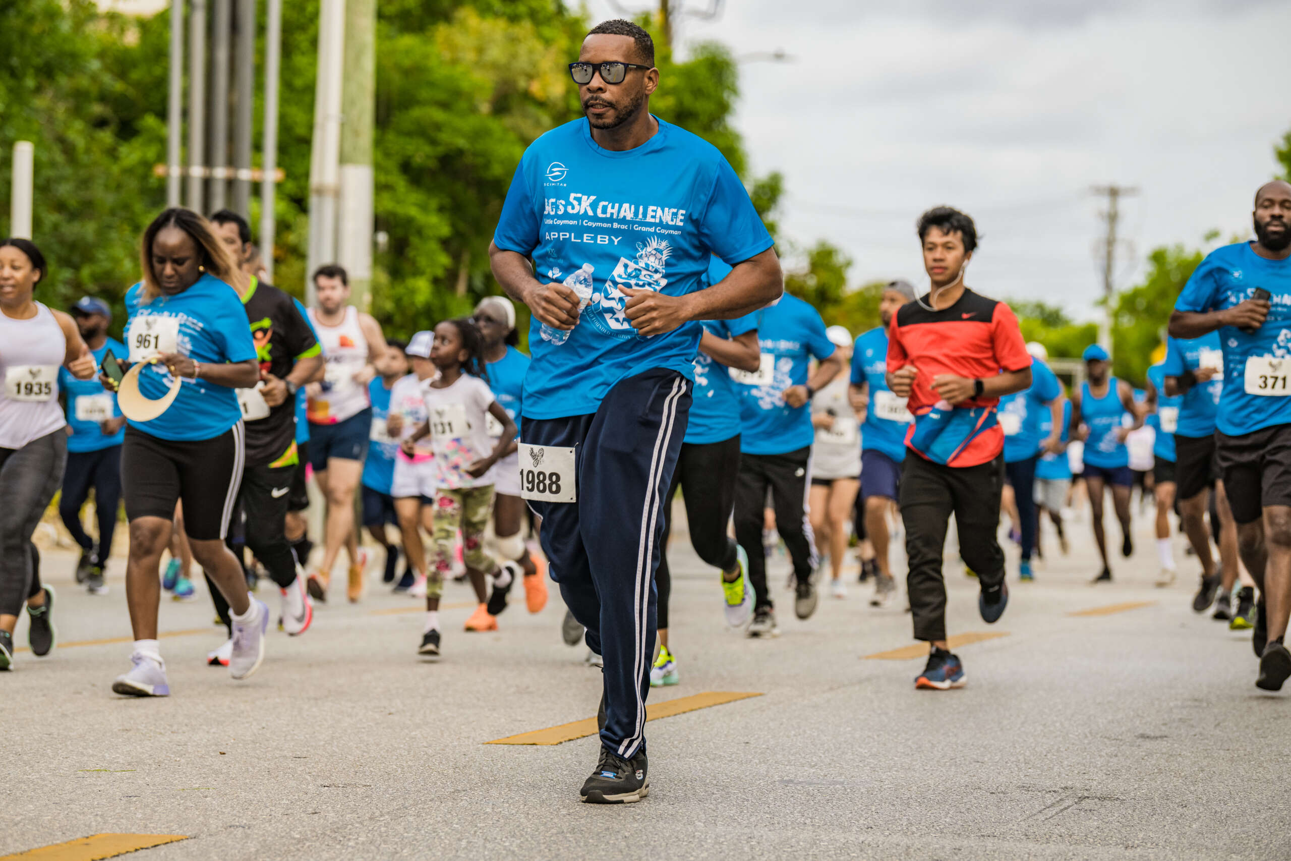 DG encourages exercise as hundreds hit the road for annual 5k - Cayman ...