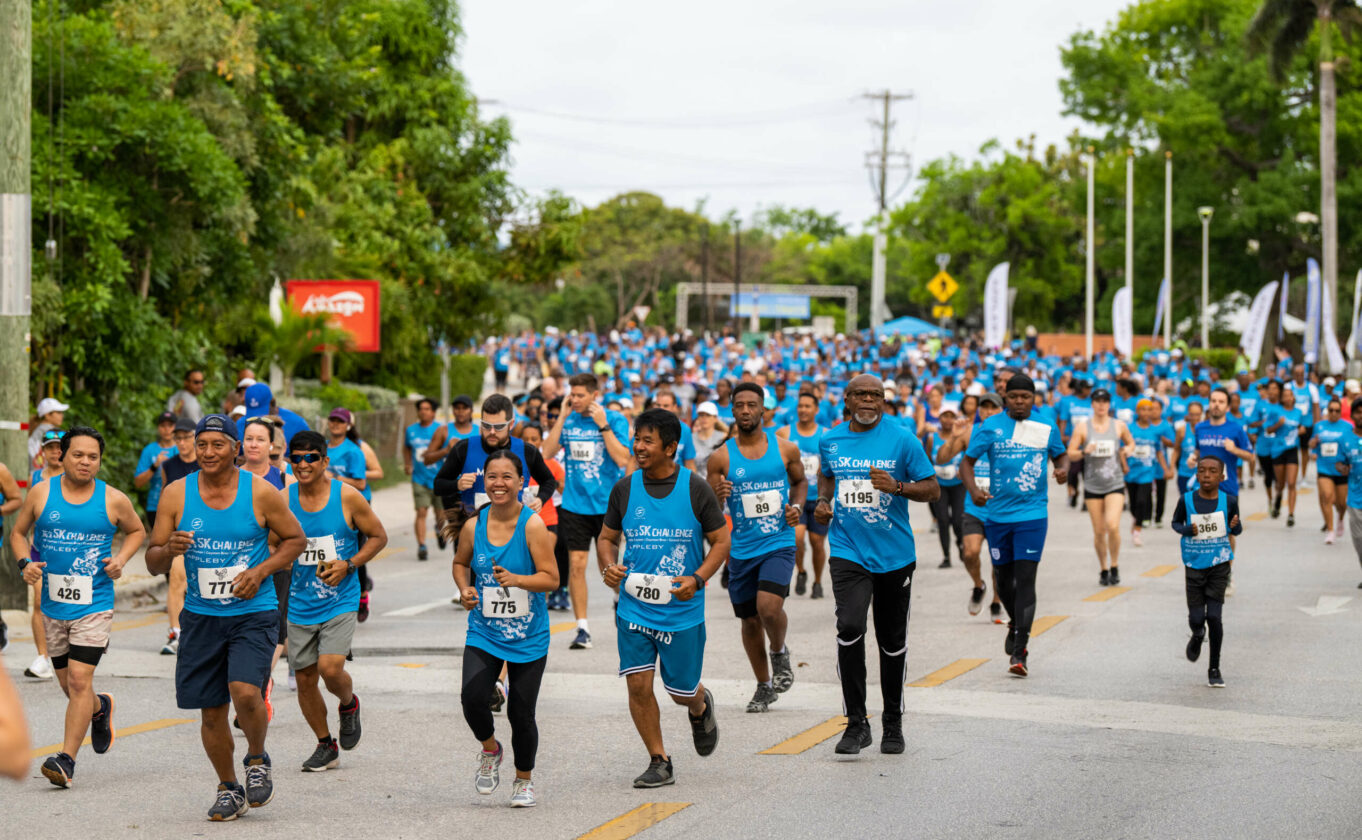 DG encourages exercise as hundreds hit the road for annual 5k - Cayman ...