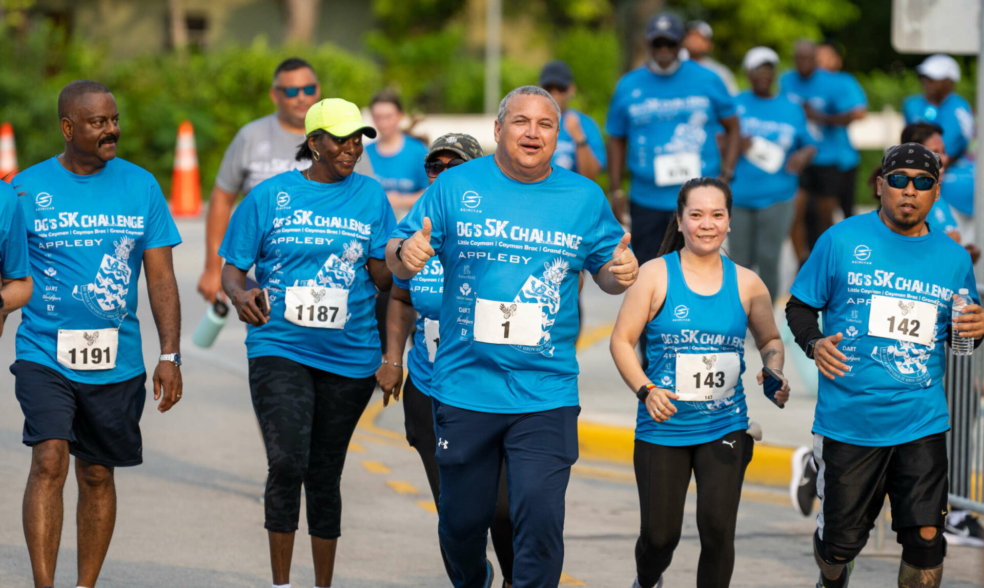 DG encourages exercise as hundreds hit the road for annual 5k - Cayman ...