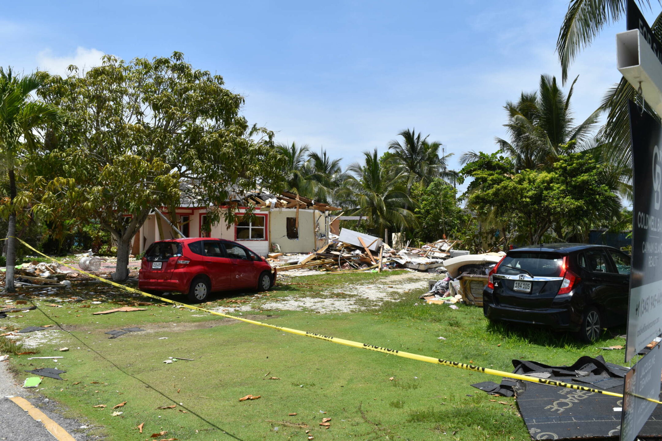 Residents begin repairs as street opened following house explosion ...