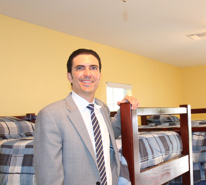 Garth Arch 'very humbled' by MBE award - Cayman Compass