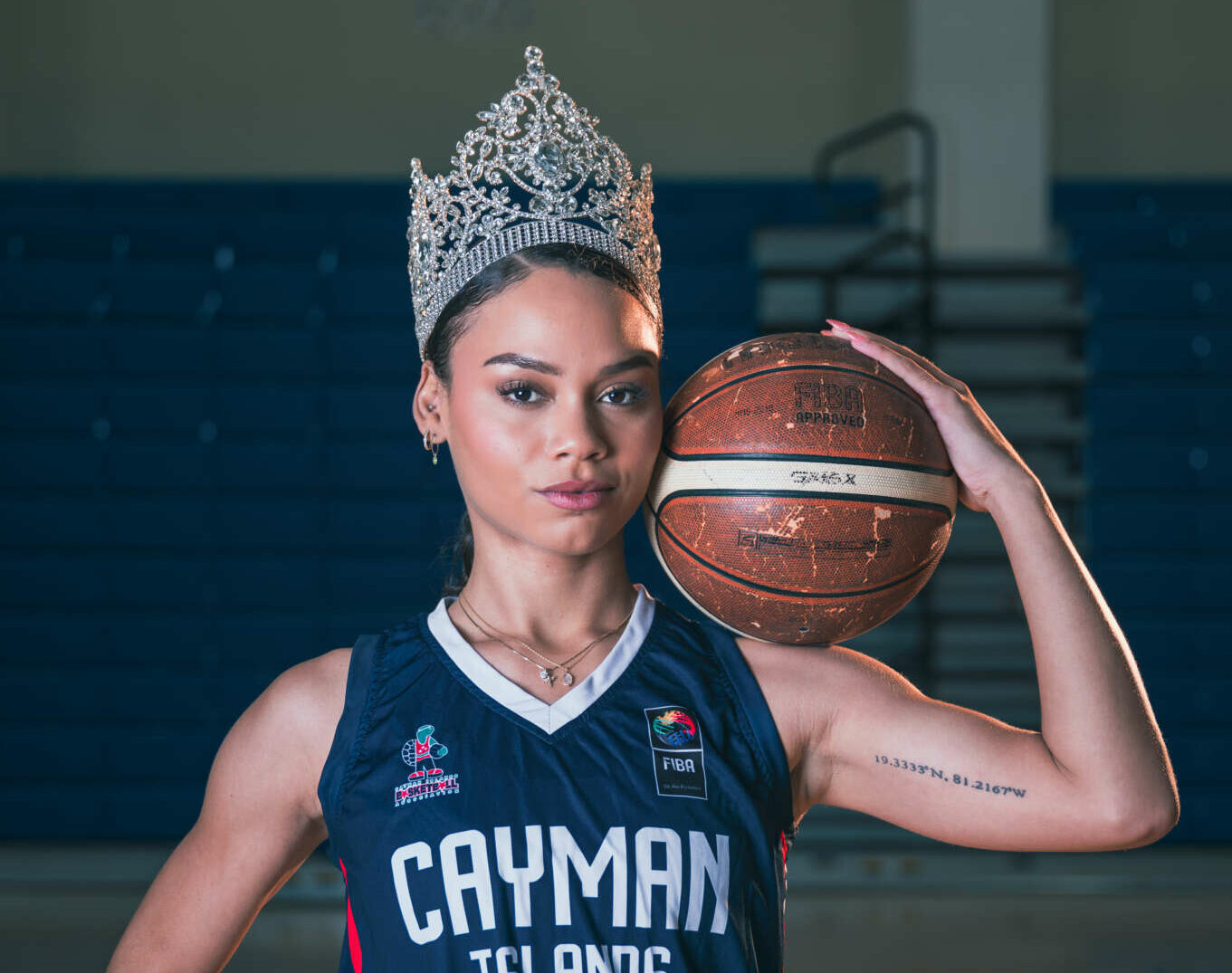 Chloe Powery-Doxey with crown and basketball - Cayman Compass