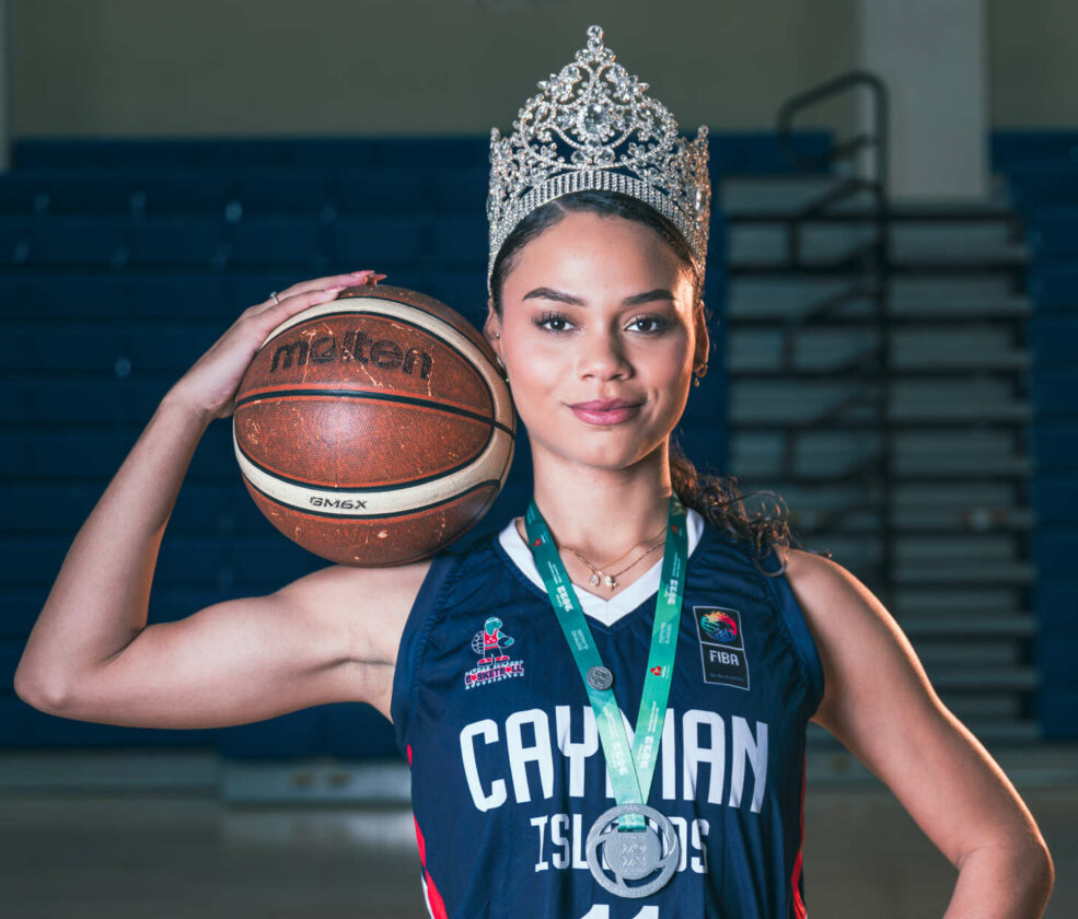 Chloe Powery-Doxey with crown and basketball - Cayman Compass