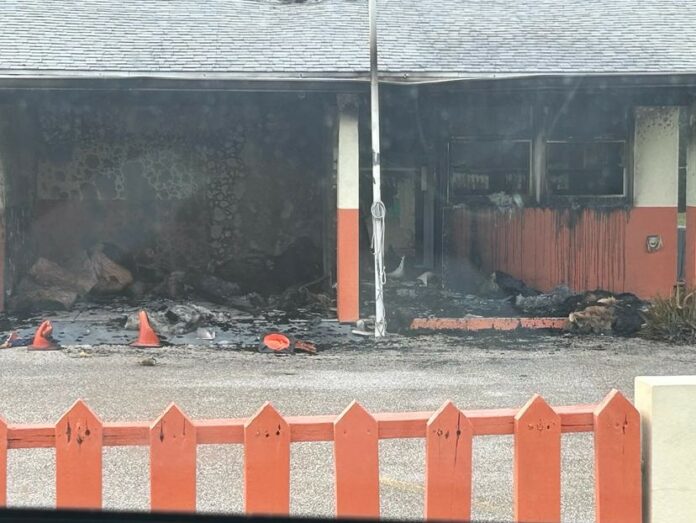 Probe launched after fire at North Side police station - Cayman Compass