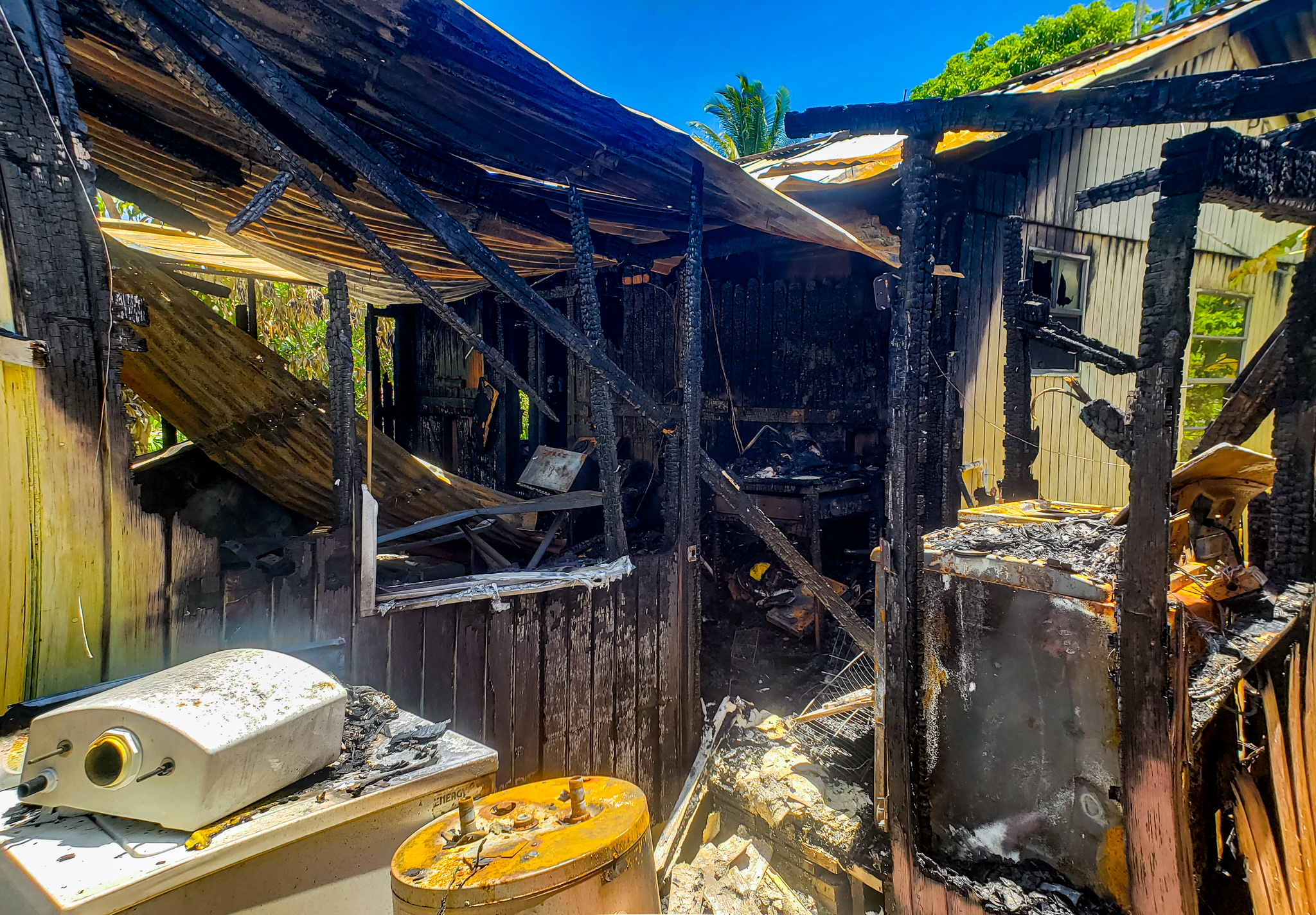 House goes up in flames after being struck by lightning - Cayman Compass