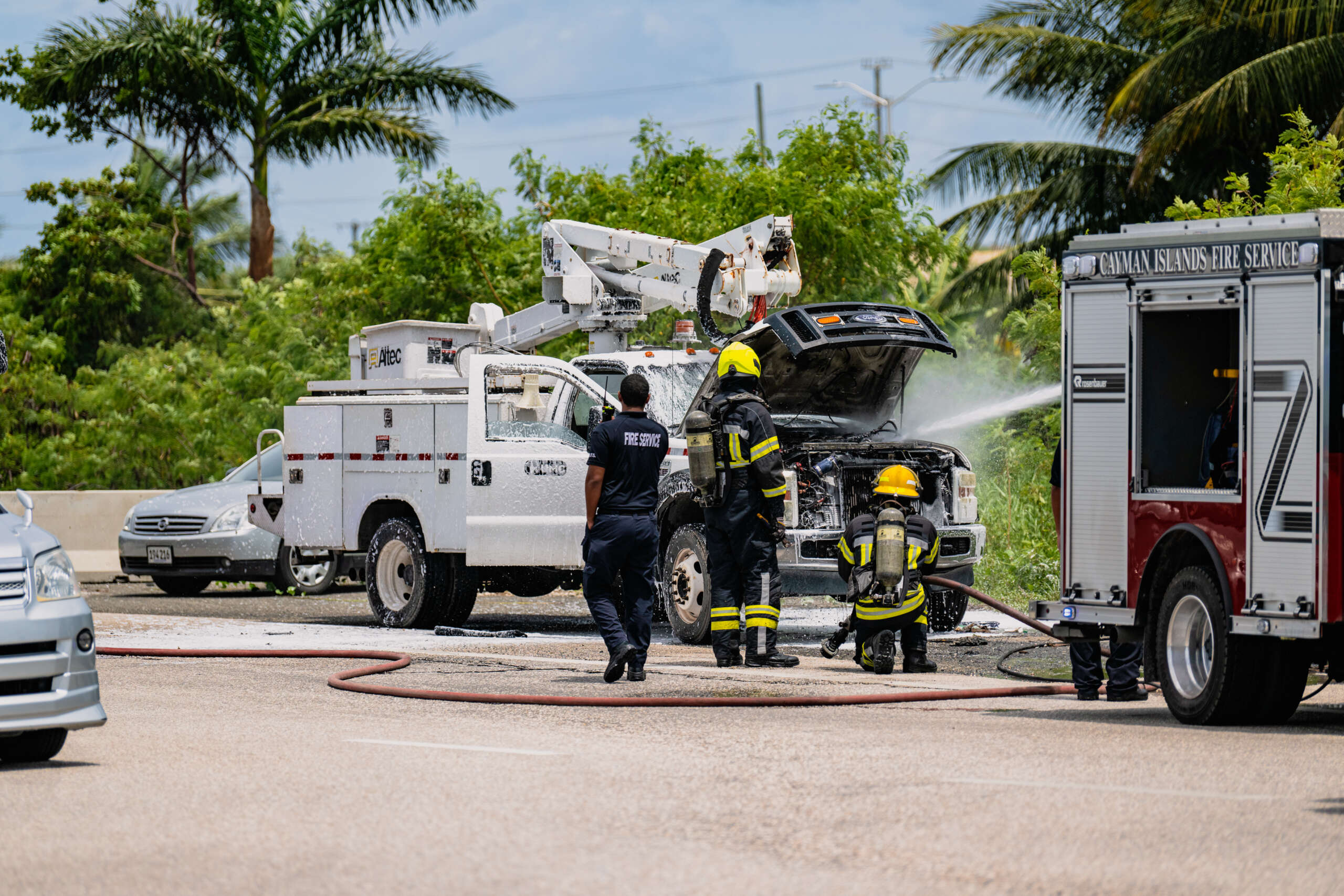 Firefighters douse truck fire at roundabout - Cayman Compass