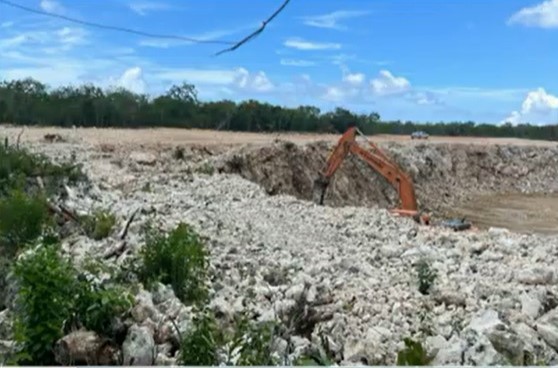quarry digging - Cayman Compass