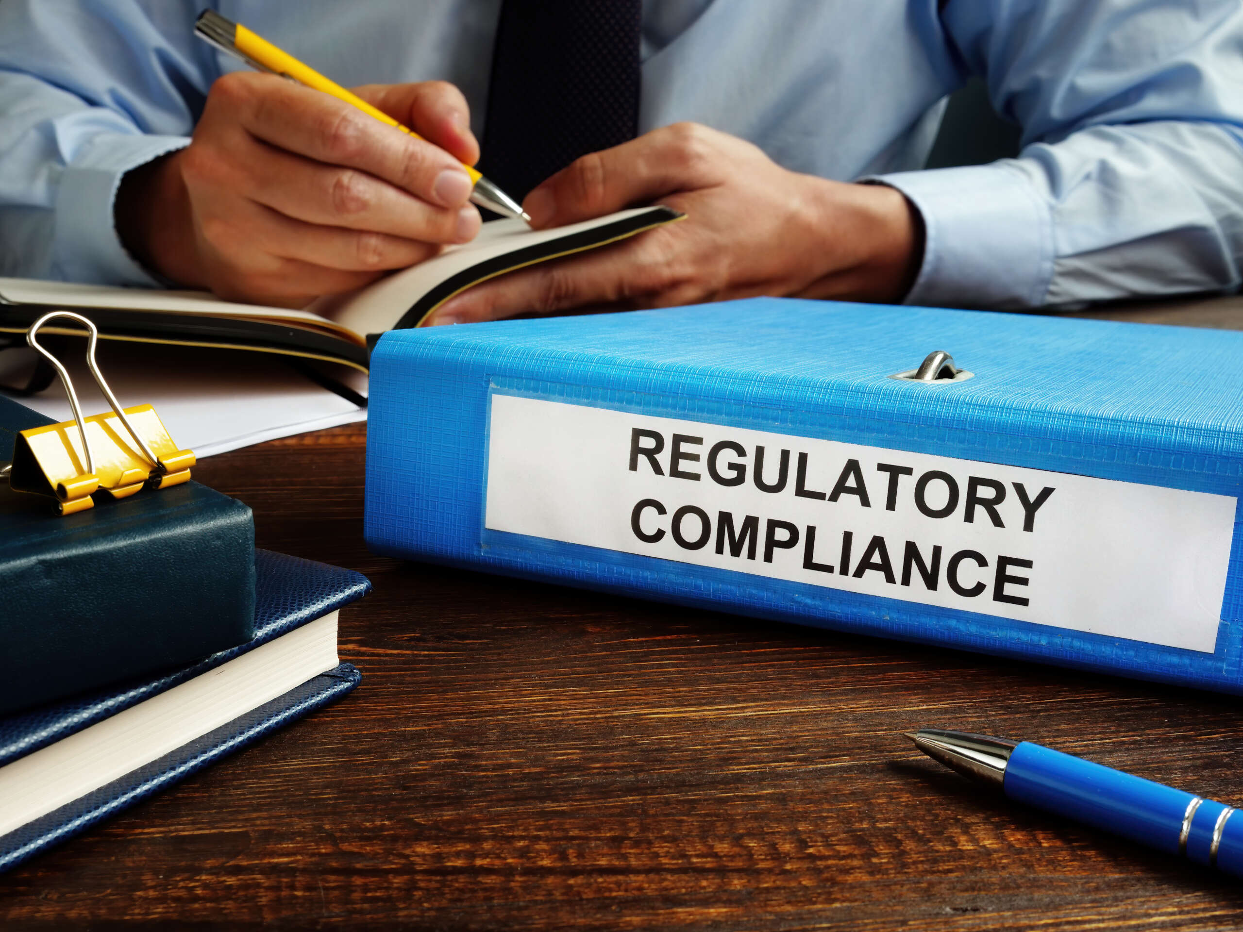 Investors and big businesses foresee higher regulatory fines - Cayman Compass