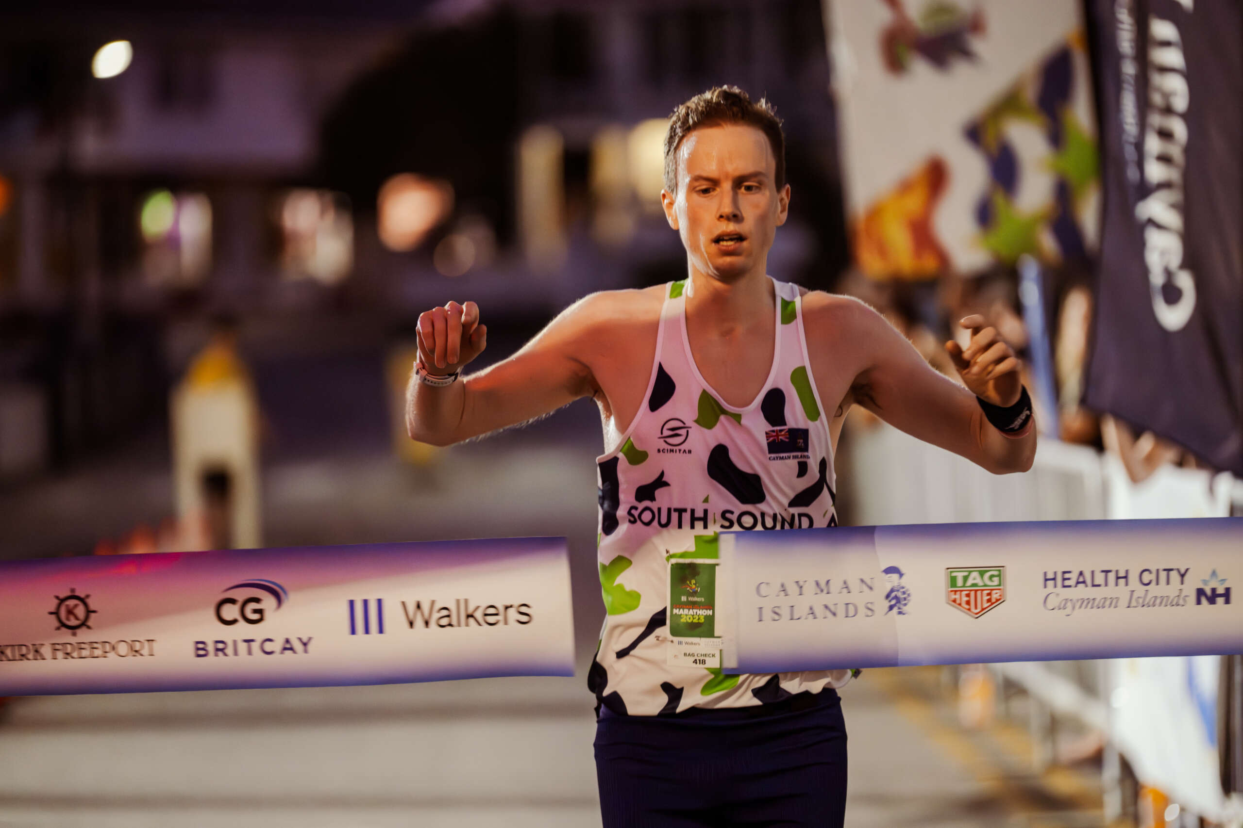 From assault survivor to marathon glory for new champ Oddy - Cayman Compass