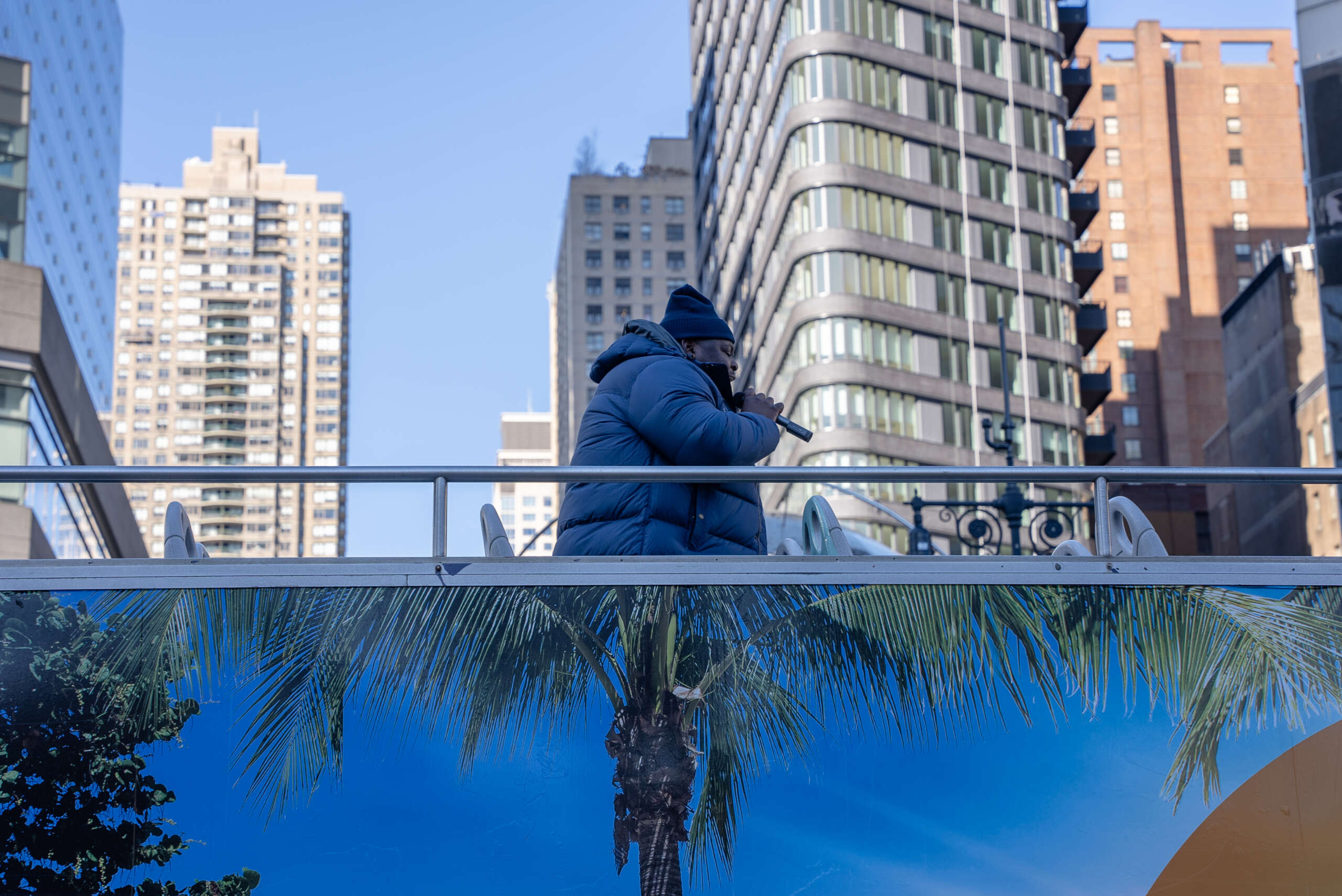 Local musician spreads 'Caymankind' on NYC’s double decker bus - Cayman ...