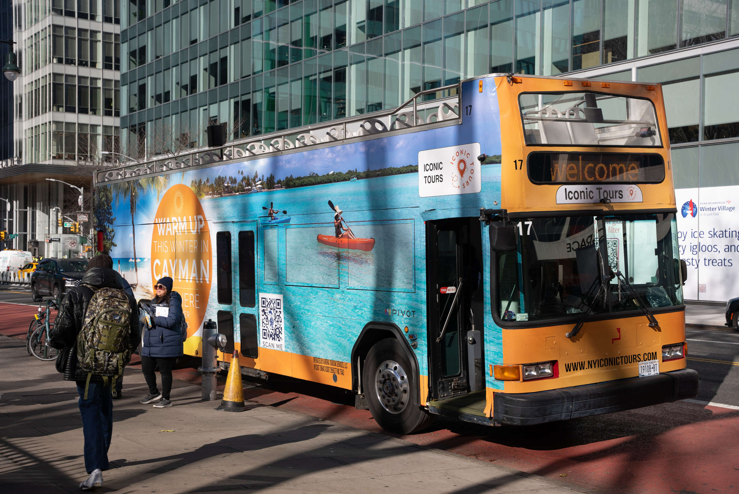 Local musician spreads 'Caymankind' on NYC’s double decker bus - Cayman ...