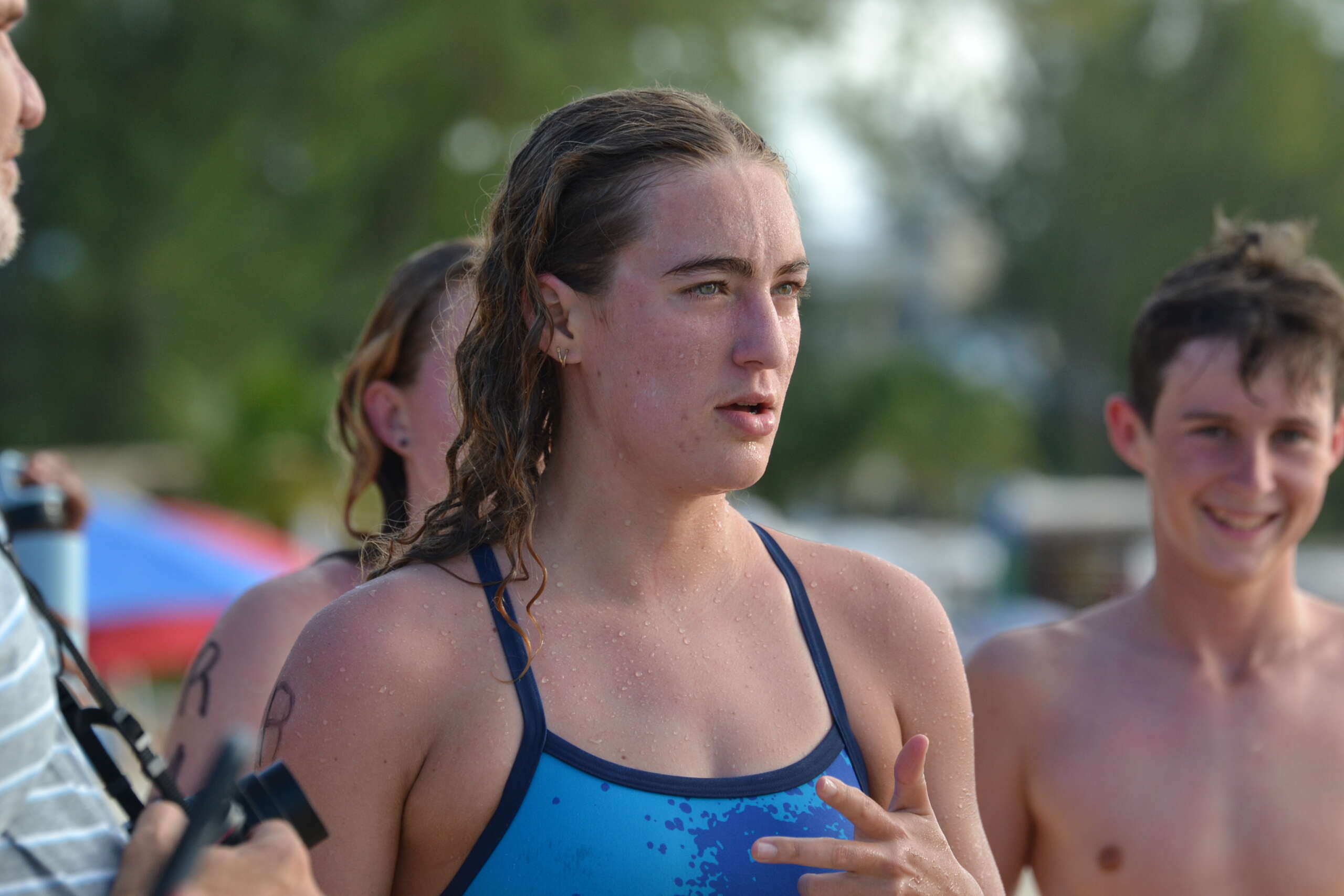 Swimmers share gold at annual CUC Sea Swim - Cayman Compass