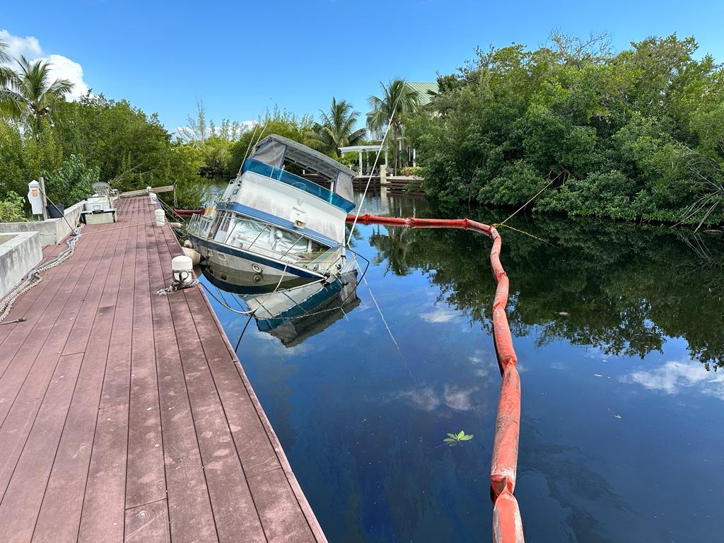 DoE monitoring sunken vessel in North Sound Estates - Cayman Compass