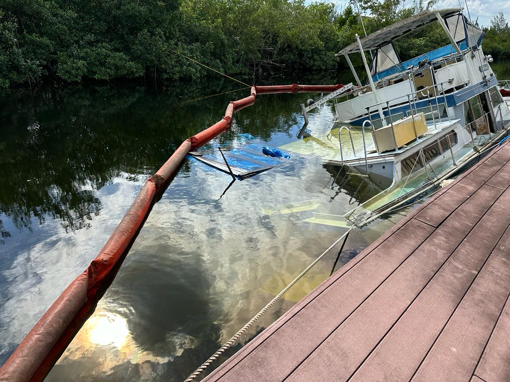 DoE monitoring sunken vessel in North Sound Estates - Cayman Compass
