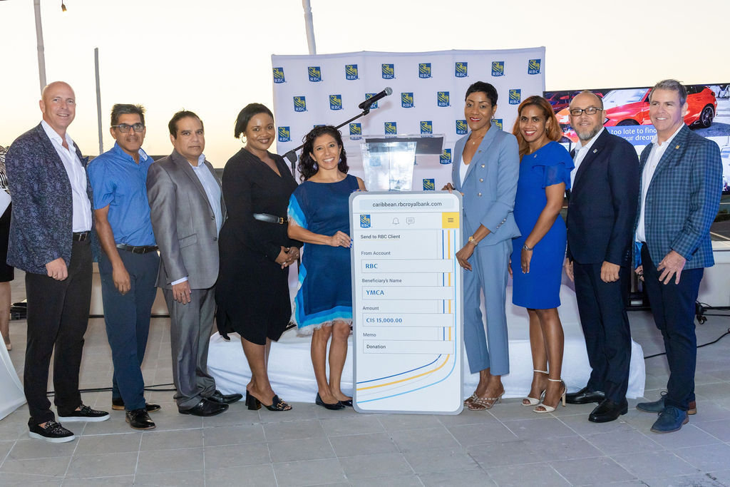 RBC Celebrates 60 years in Cayman with YMCA Donation - Cayman Compass