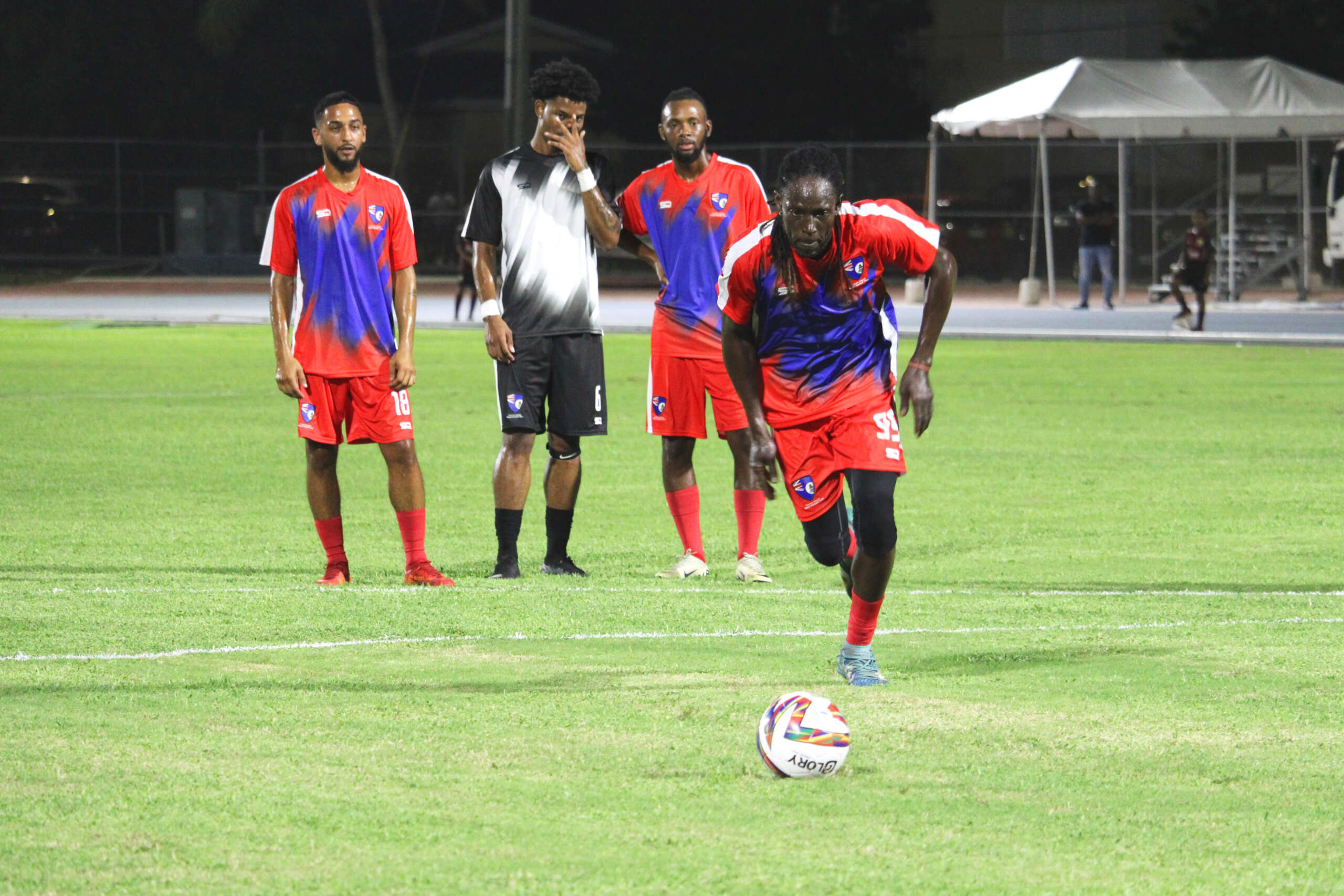 Football legend Coach 'Gillie' Seymour gets his flowers - Cayman Compass