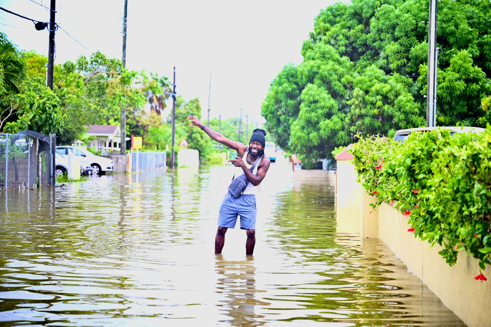 Floods hit home as Grand Cayman showered with heavy rainfall - Cayman ...