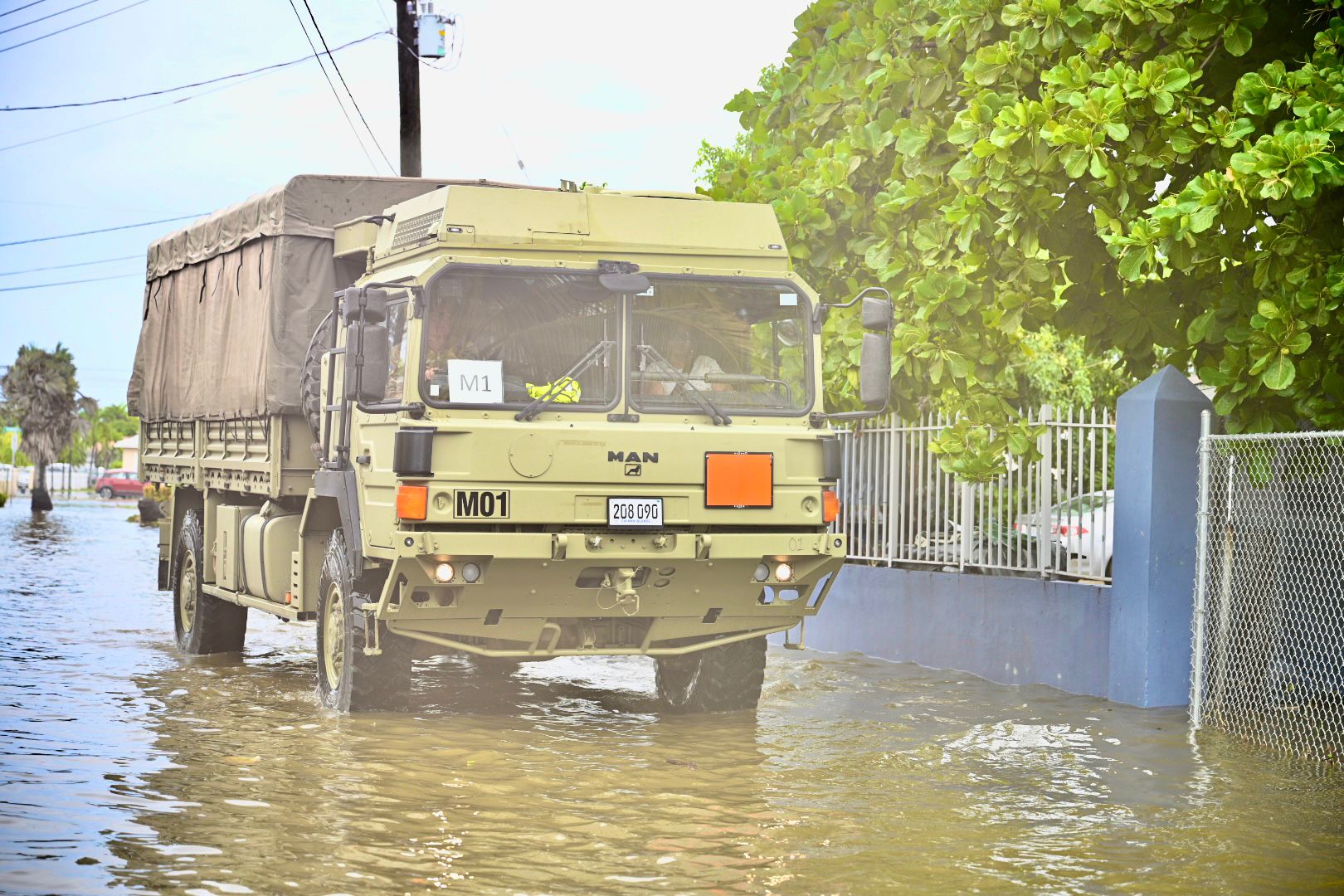 Floods hit home as Grand Cayman showered with heavy rainfall - Cayman ...