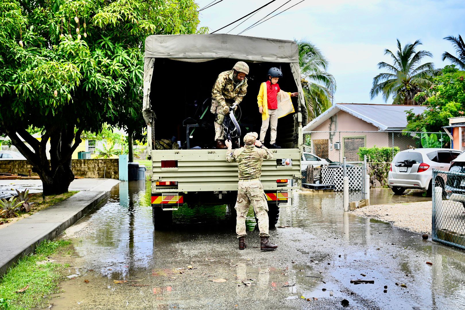 Floods hit home as Grand Cayman showered with heavy rainfall - Cayman ...