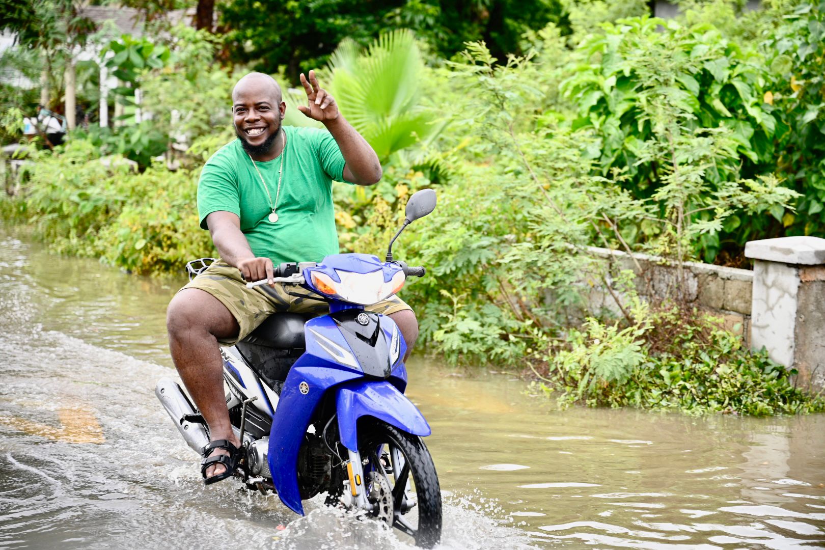 Floods hit home as Grand Cayman showered with heavy rainfall - Cayman ...