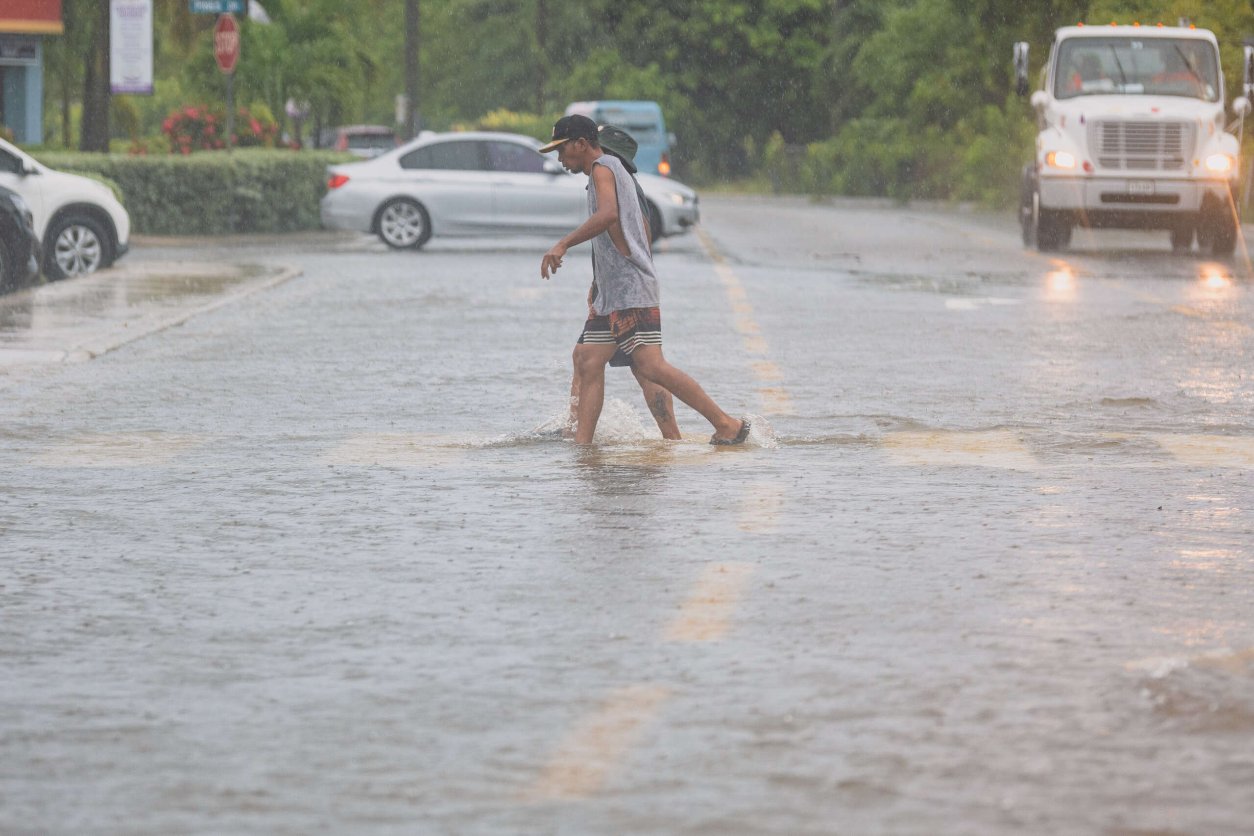 Floods hit home as Grand Cayman showered with heavy rainfall - Cayman ...
