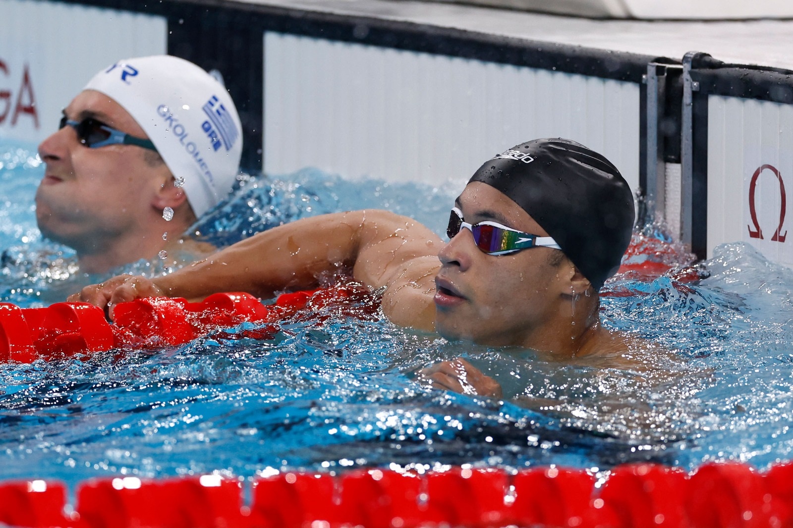 Crooks a split-second from glory in valiant Olympic effort - Cayman Compass