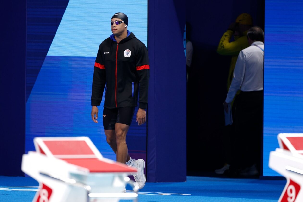 Crooks a split-second from glory in valiant Olympic effort - Cayman Compass