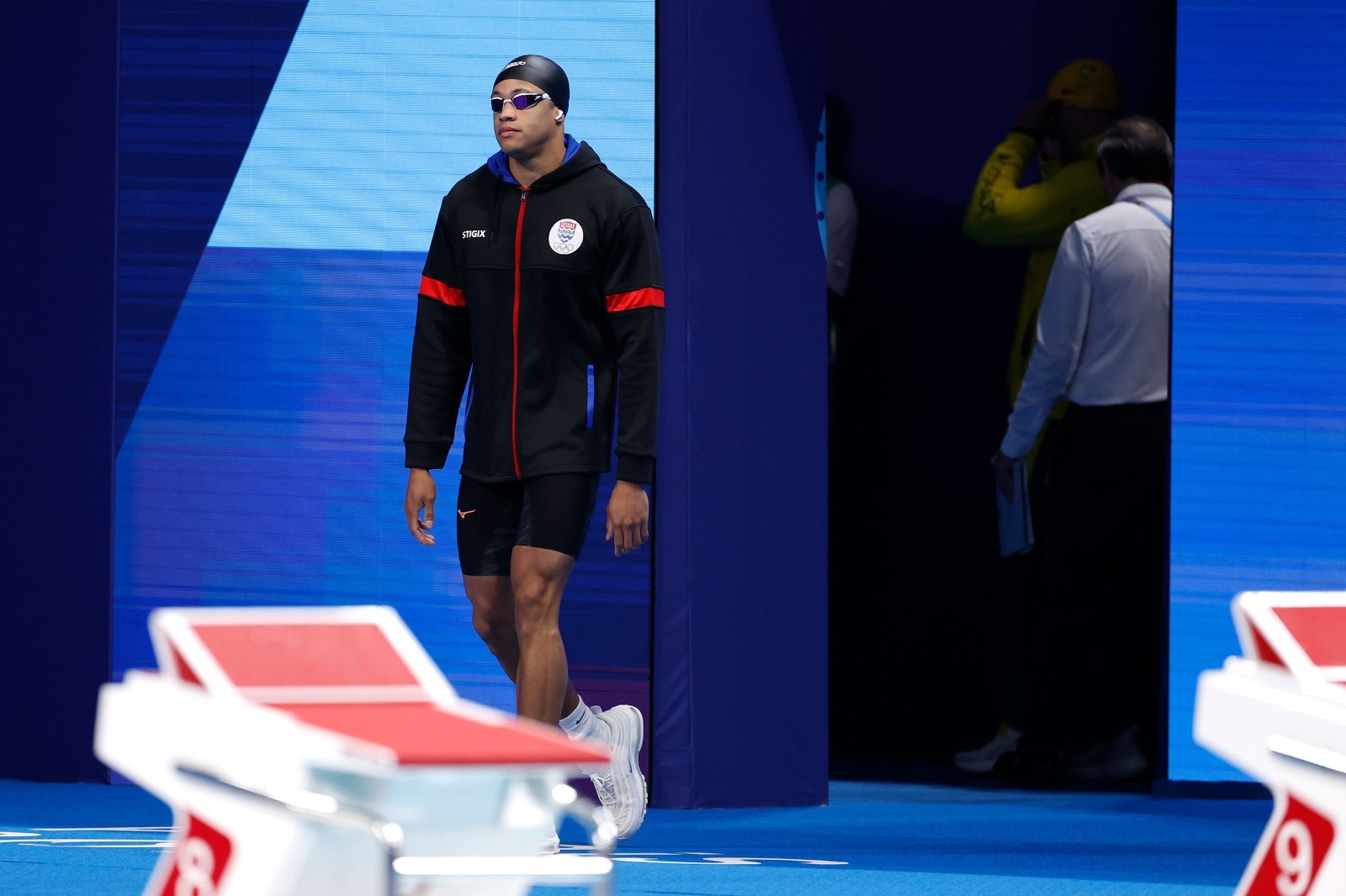 Crooks a split-second from glory in valiant Olympic effort - Cayman Compass