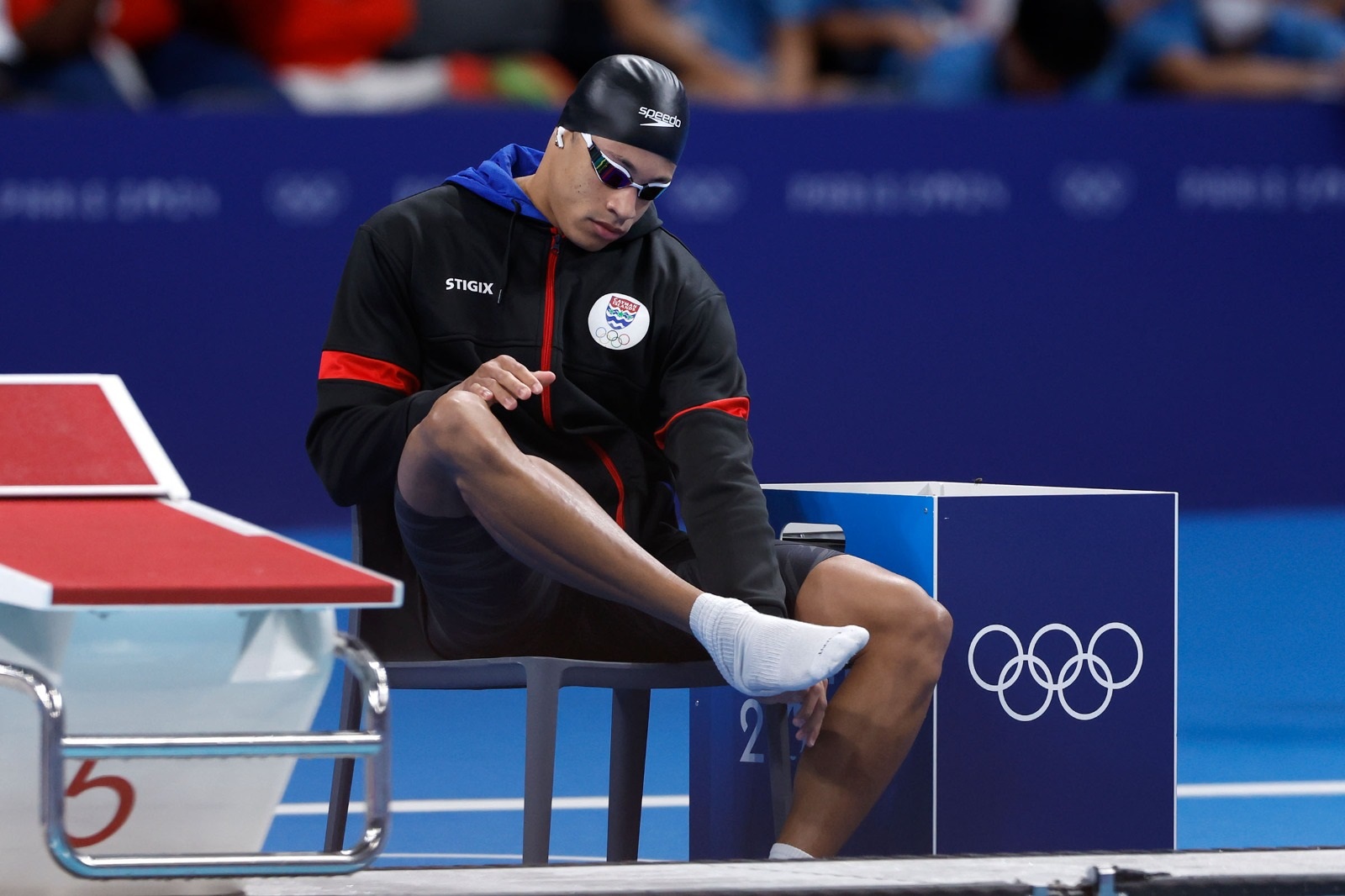 Crooks a split-second from glory in valiant Olympic effort - Cayman Compass