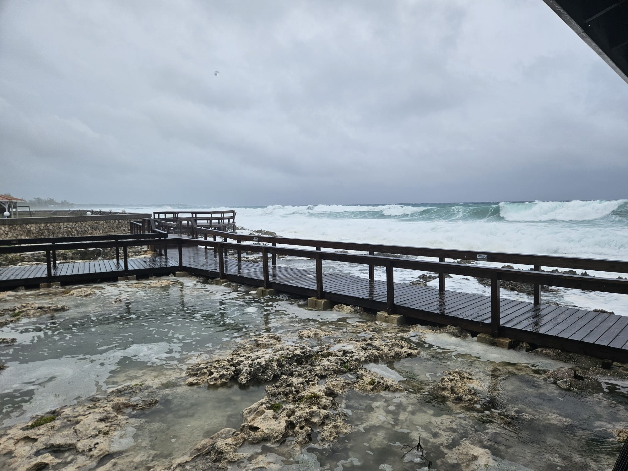 Cayman confronts floods from Helene, as tropical storm warning lifted ...