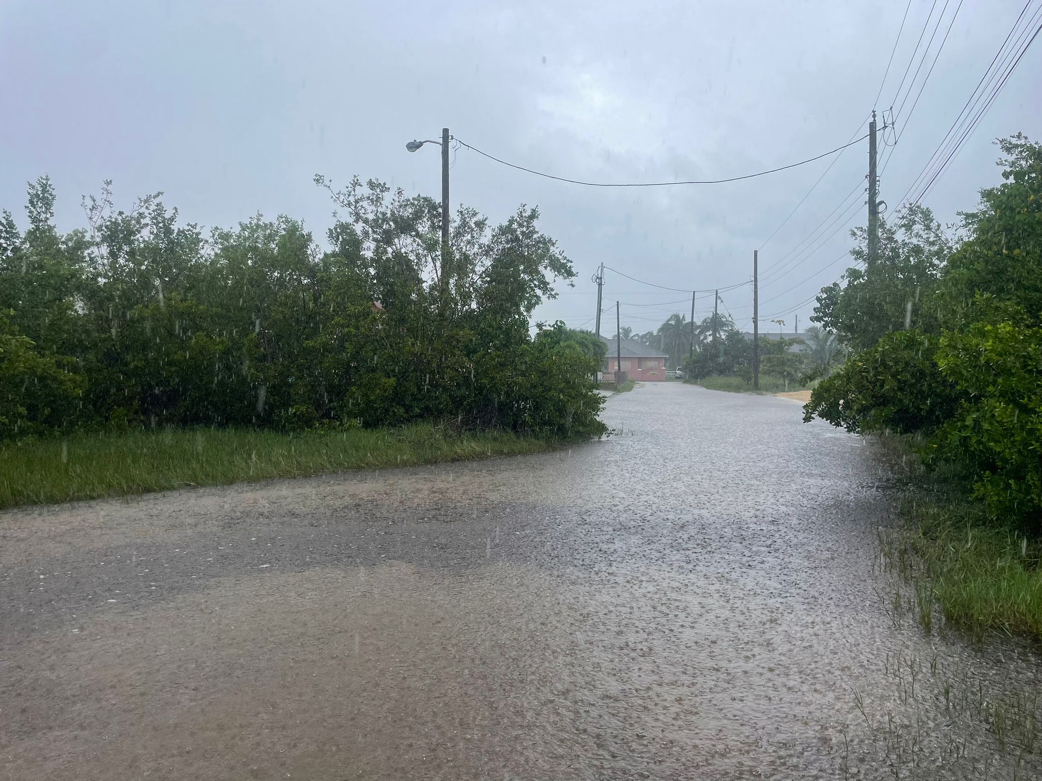 Flood advisory issued for Cayman amid developing weather system ...