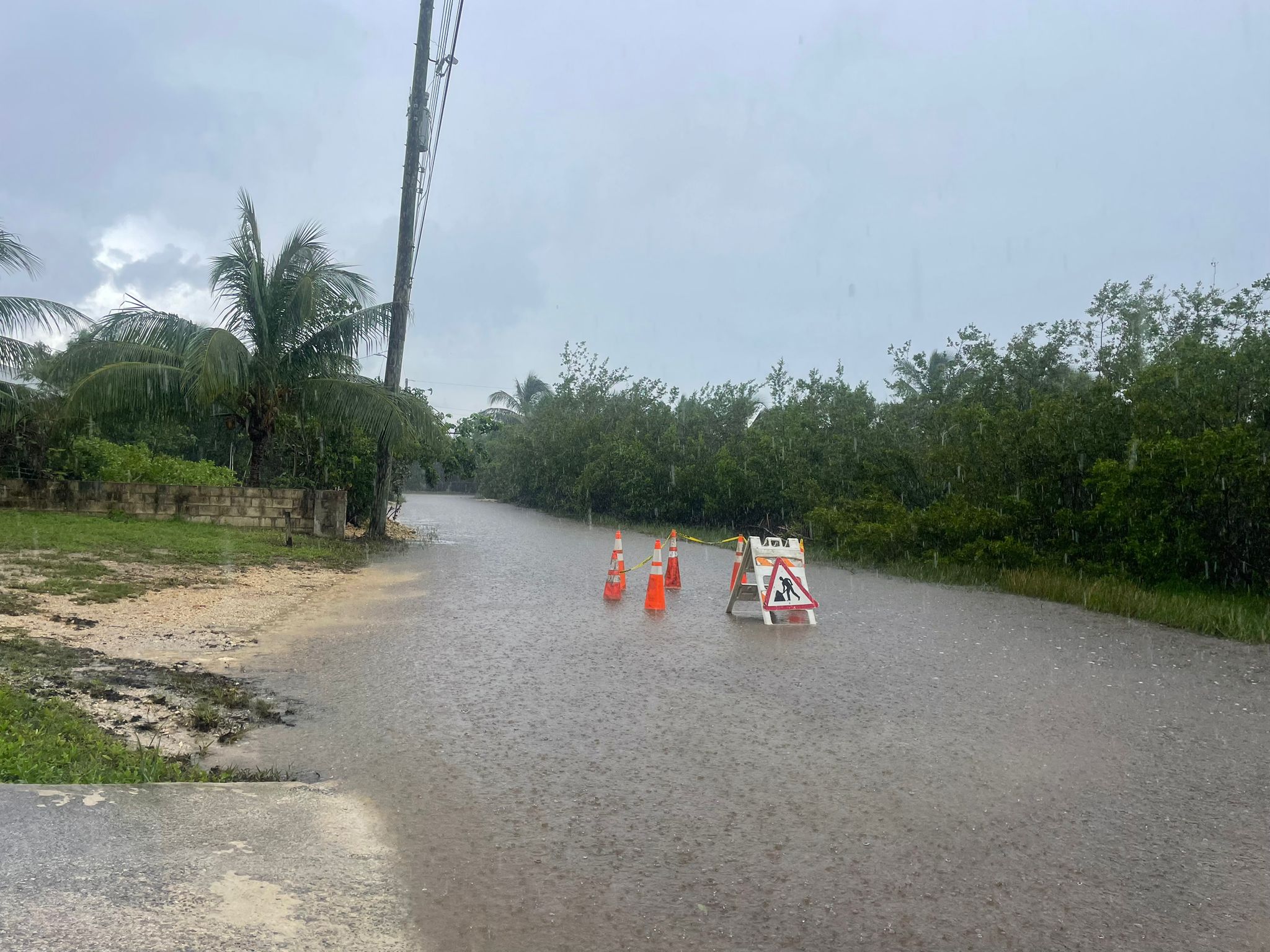 Flood advisory issued for Cayman amid developing weather system ...