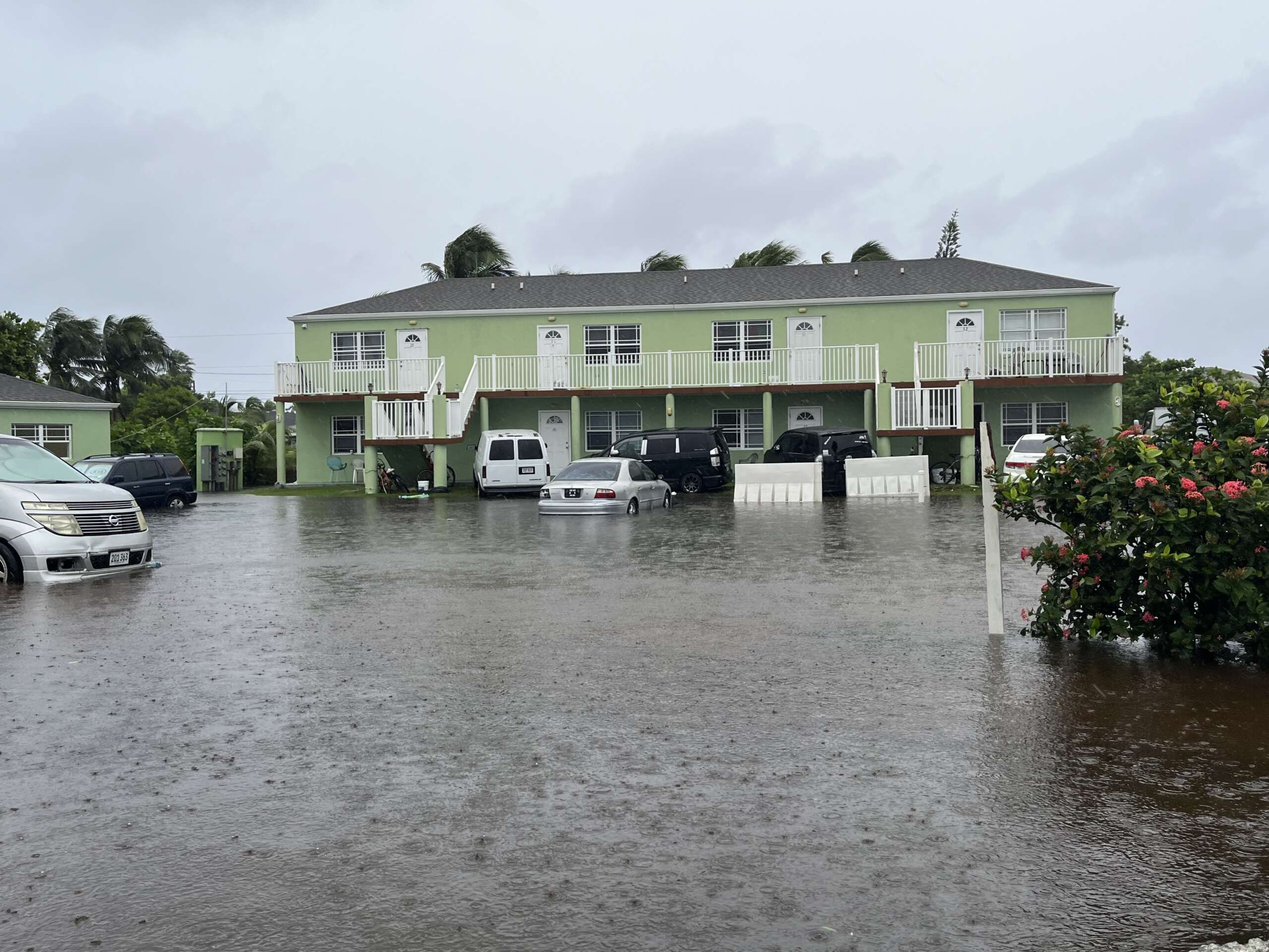 Cayman confronts floods from Helene, as tropical storm warning lifted ...