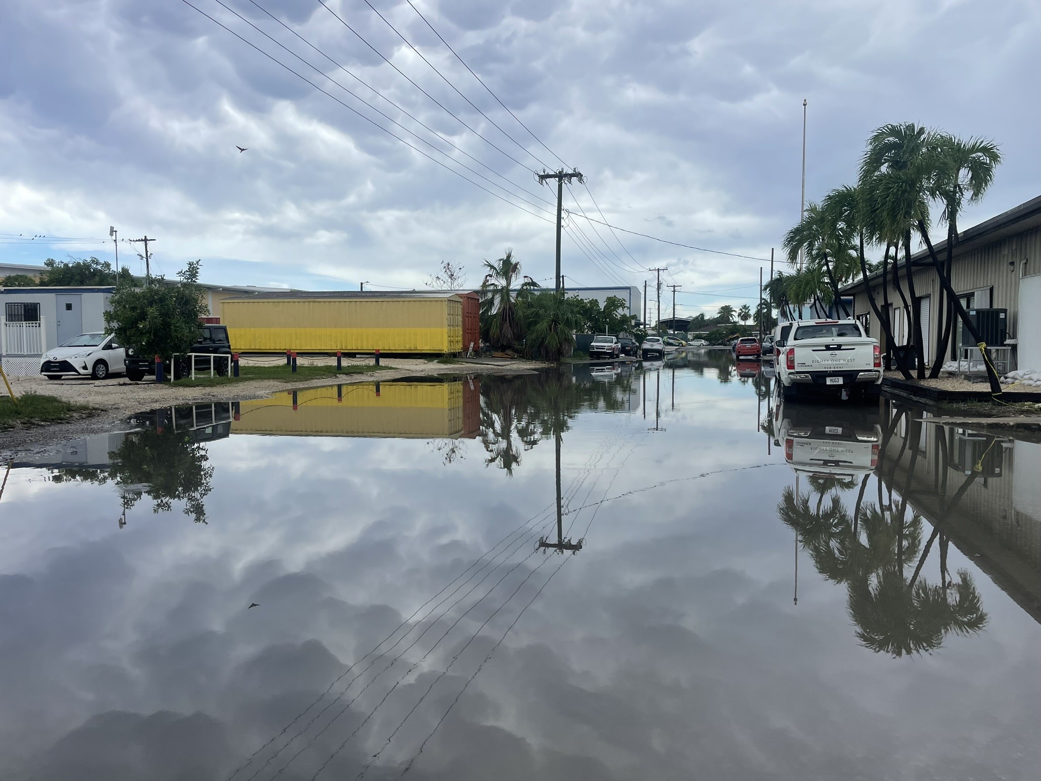 Flooding on Commercial Ave - Cayman Compass