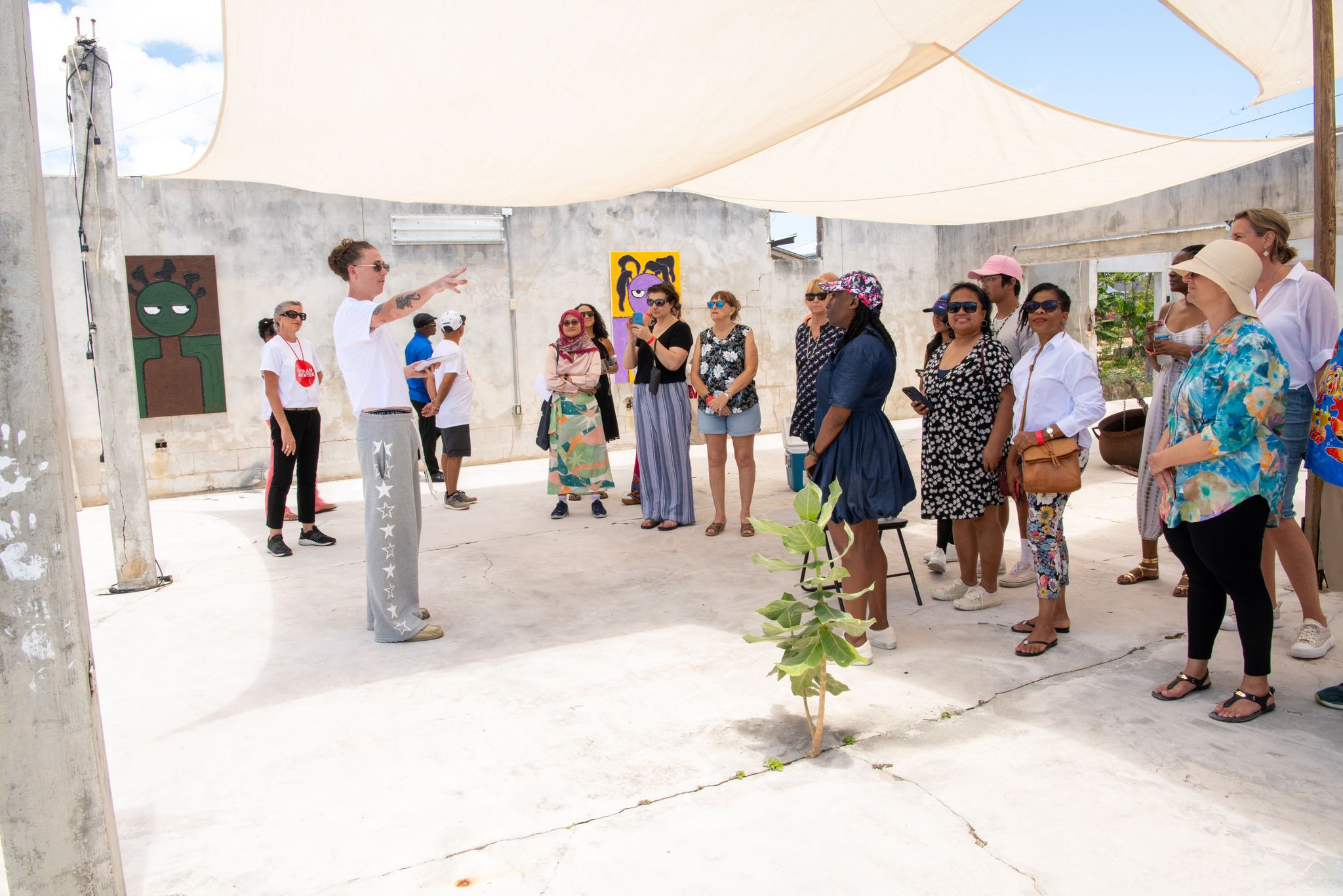 Iain MacRae speaking on his artwork for Cayman Artweek 2024 - Cayman ...