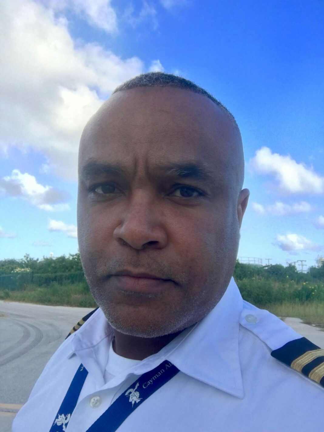 Cayman Airways pilot Adrian West immortalised with new plane - Cayman ...
