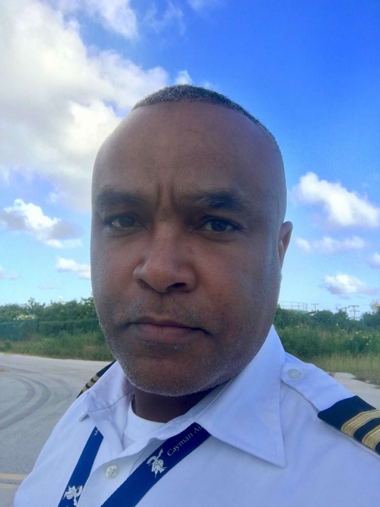 Cayman Airways pilot Adrian West immortalised with new plane - Cayman ...