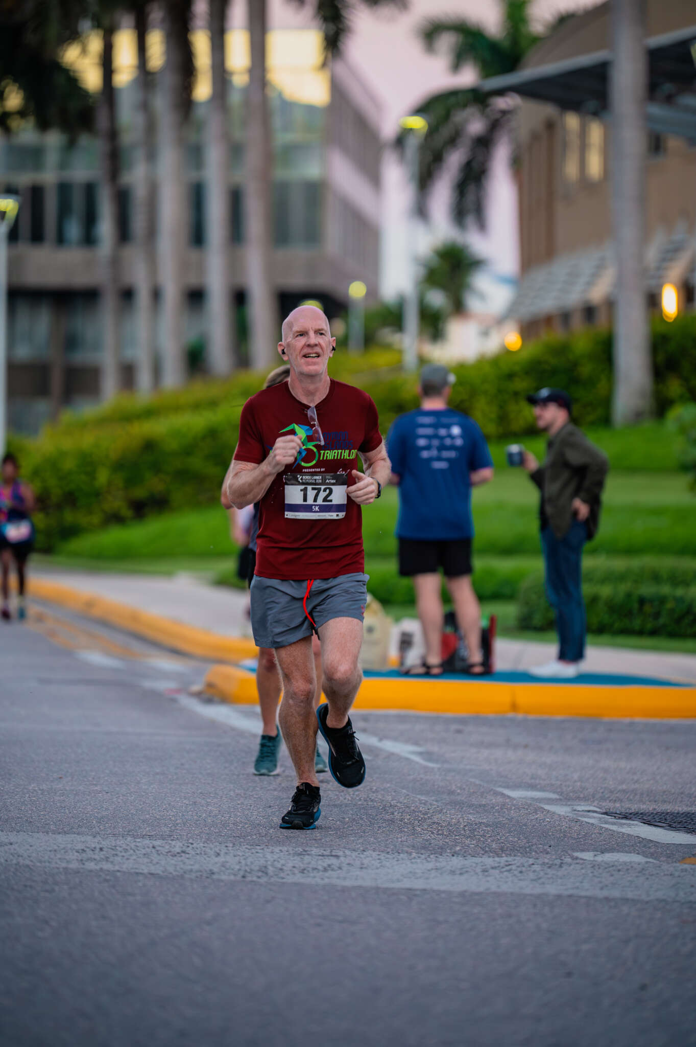 Hundreds take to the streets to honour athlete Derek Larner - Cayman ...
