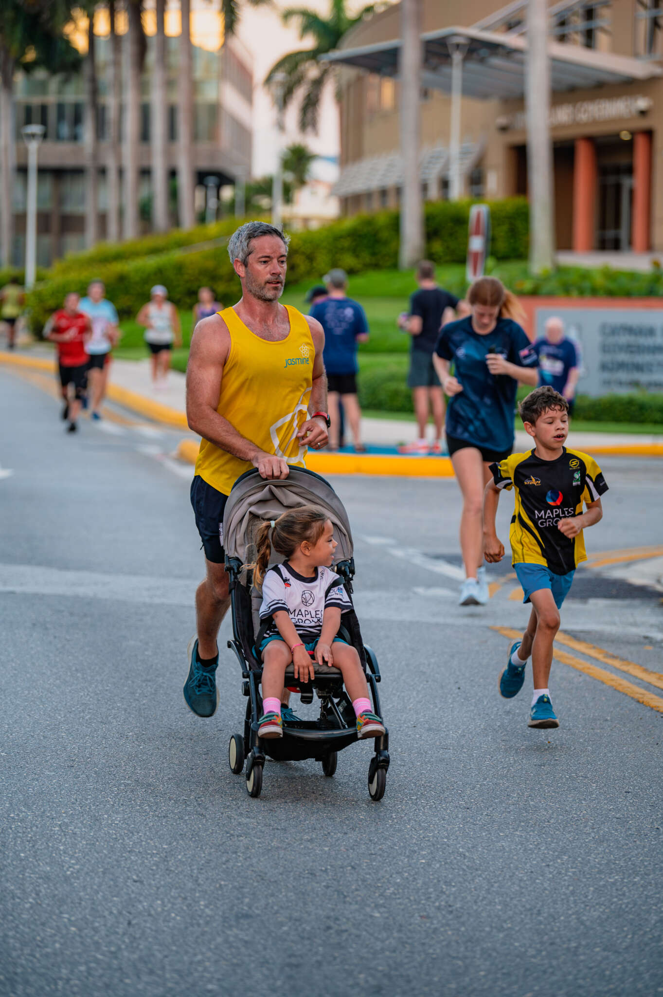 Hundreds take to the streets to honour athlete Derek Larner - Cayman ...