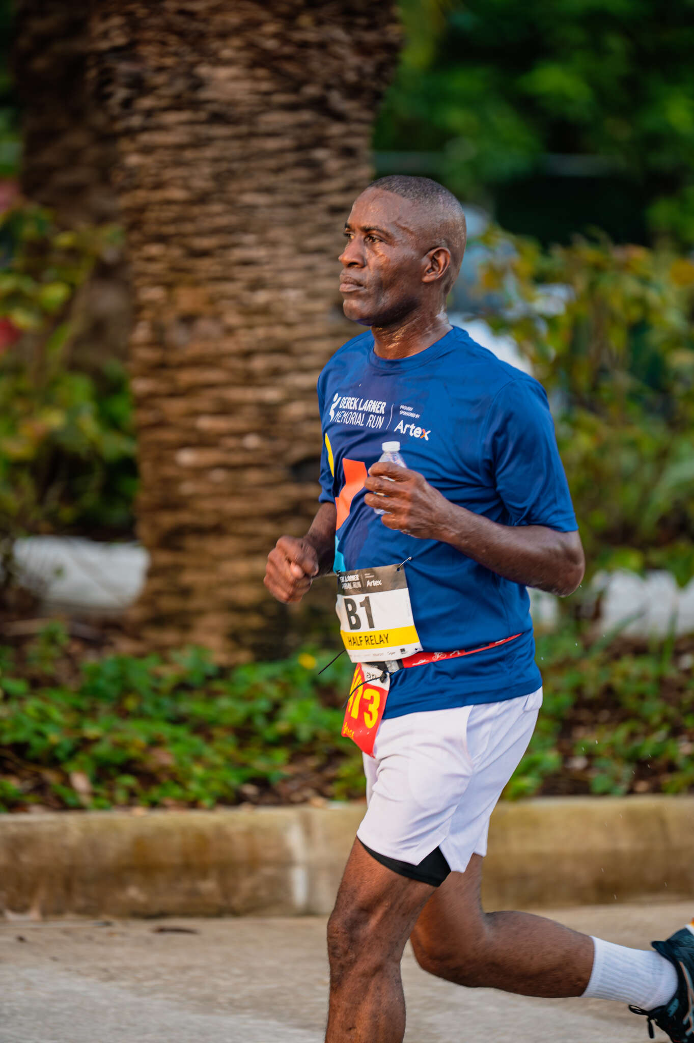 Hundreds take to the streets to honour athlete Derek Larner - Cayman ...