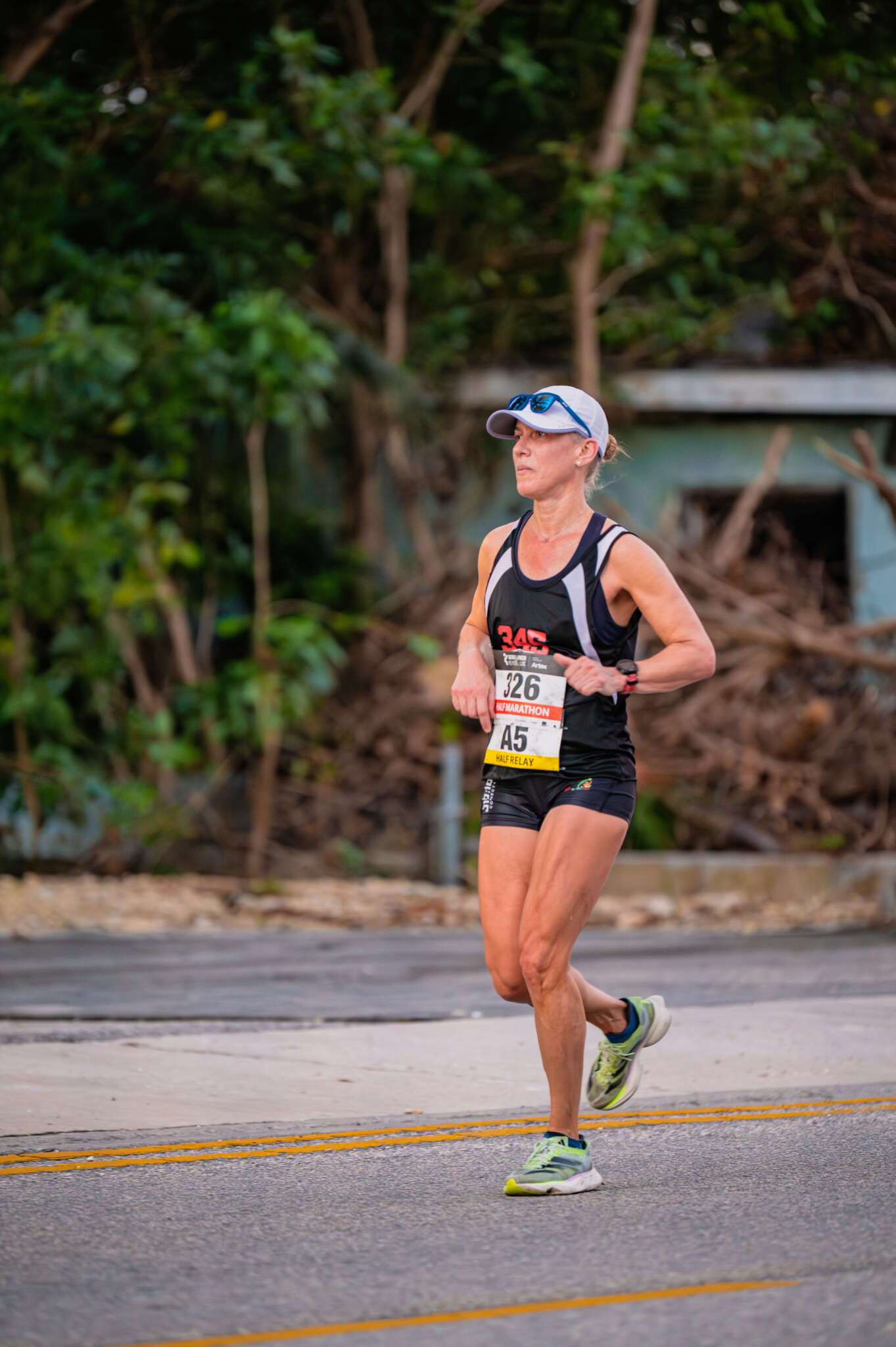 Hundreds take to the streets to honour athlete Derek Larner - Cayman ...