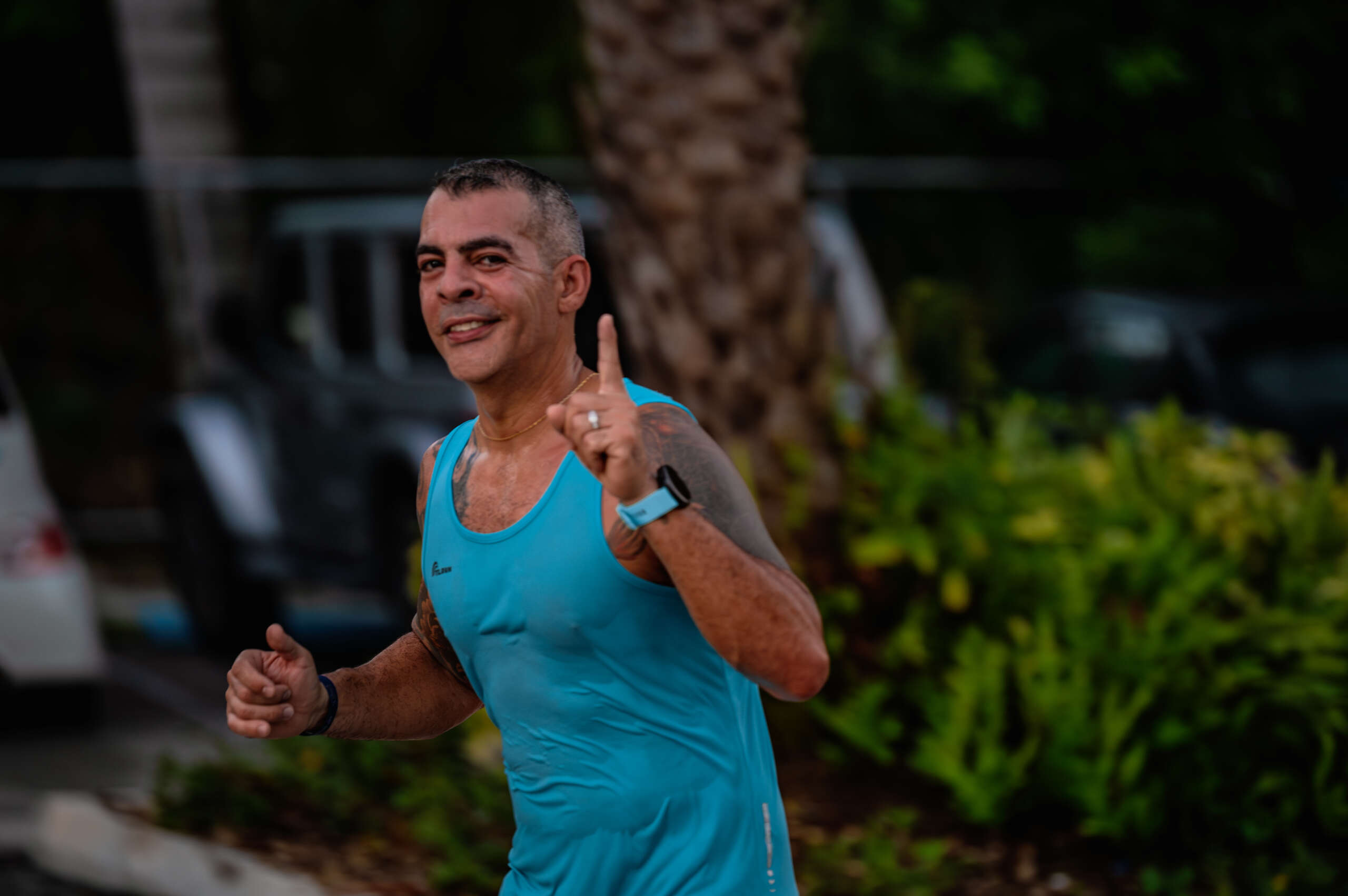 Hundreds take to the streets to honour athlete Derek Larner - Cayman ...