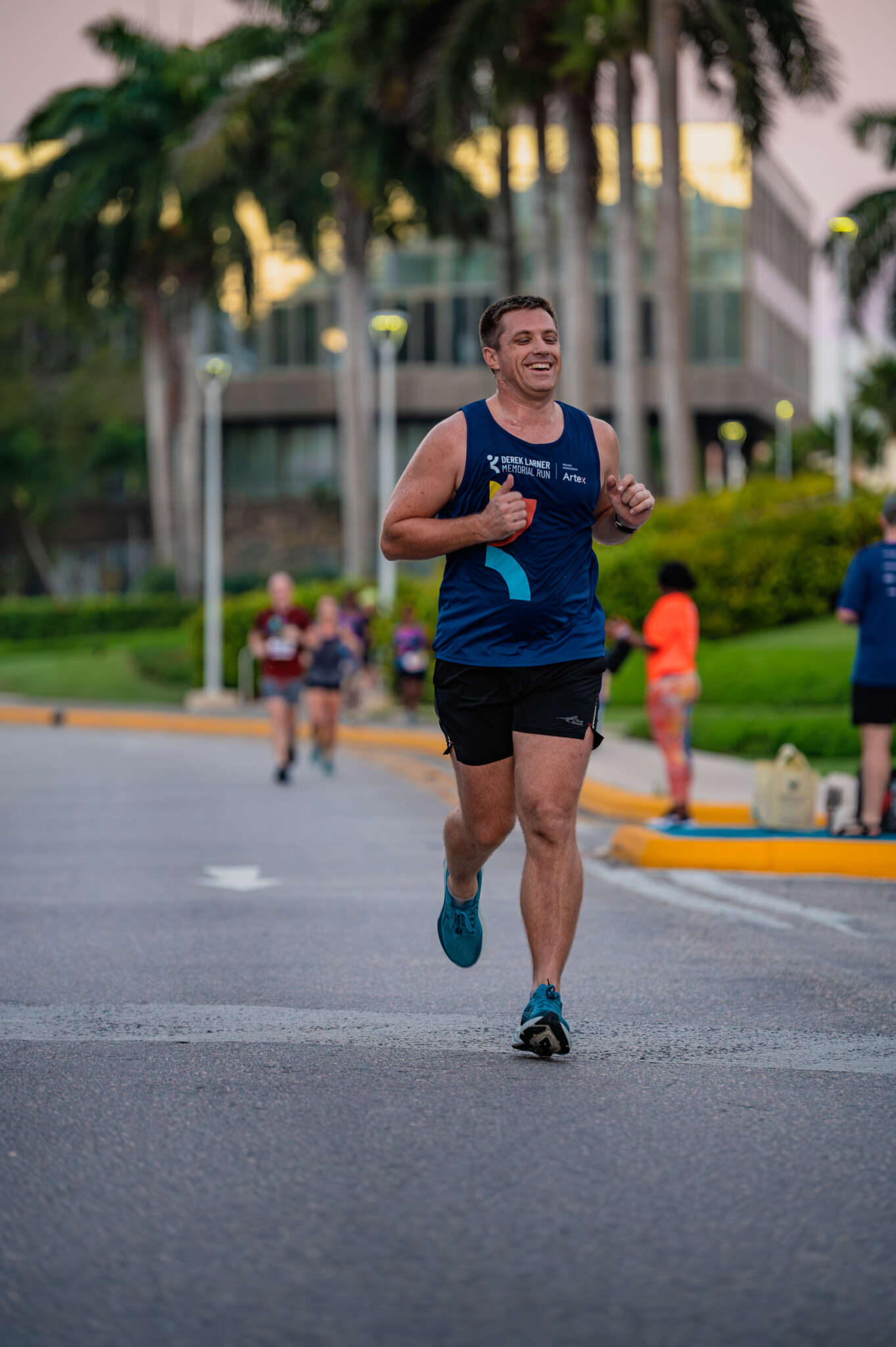 Hundreds take to the streets to honour athlete Derek Larner - Cayman ...