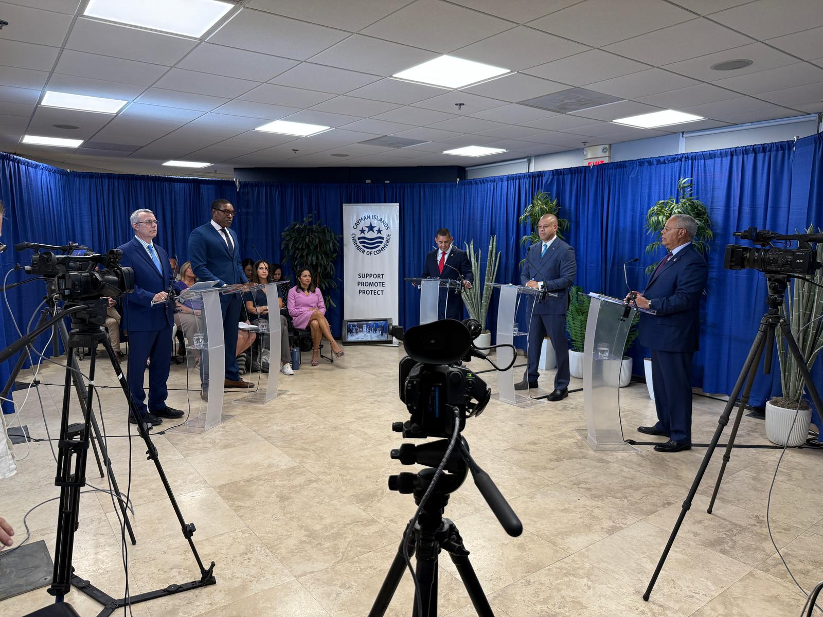 Opposition rivals unite against PPM in fiery leadership debate - Cayman ...