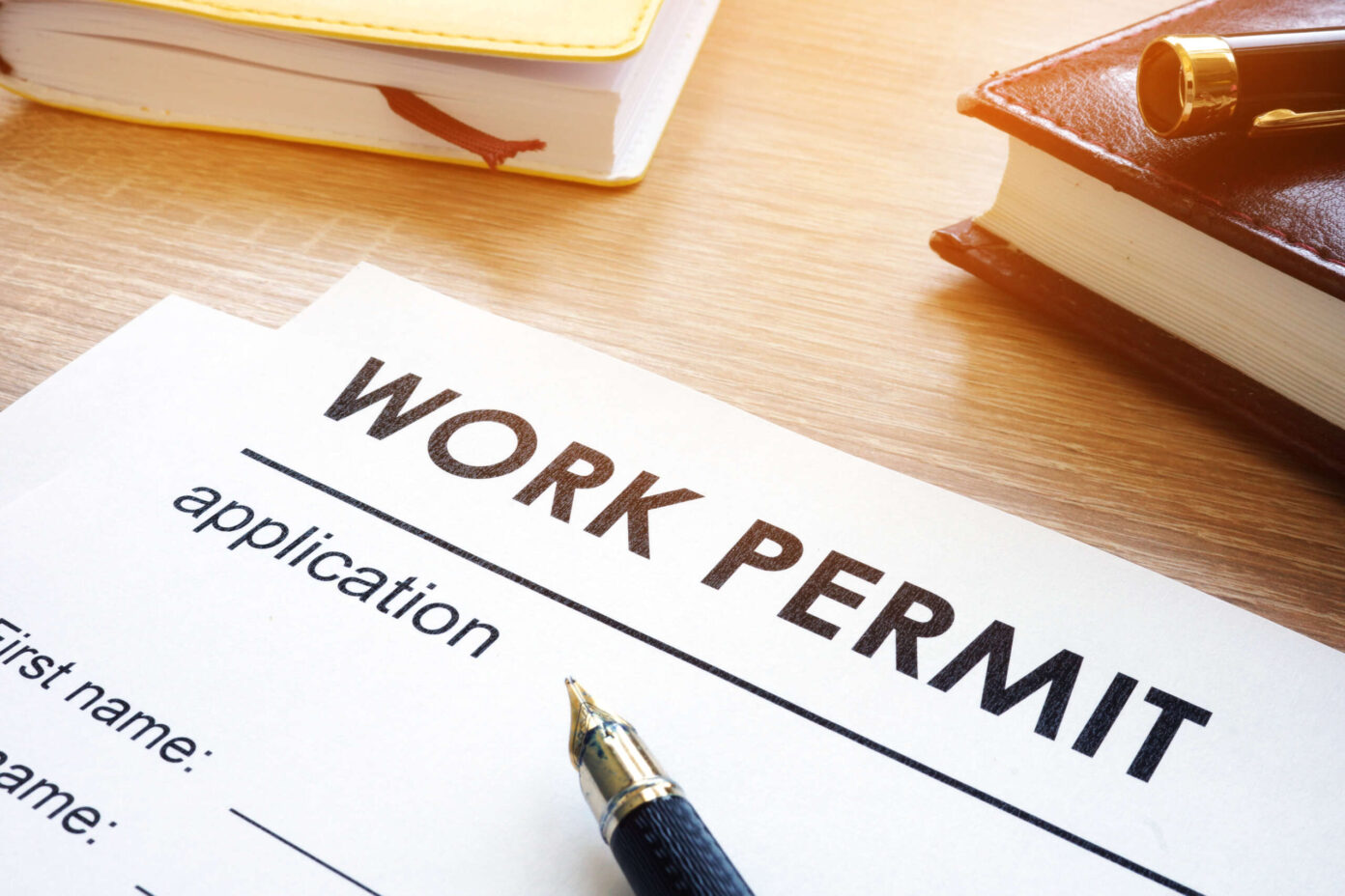 Tiered fee schedule planned for work permits - Cayman Compass