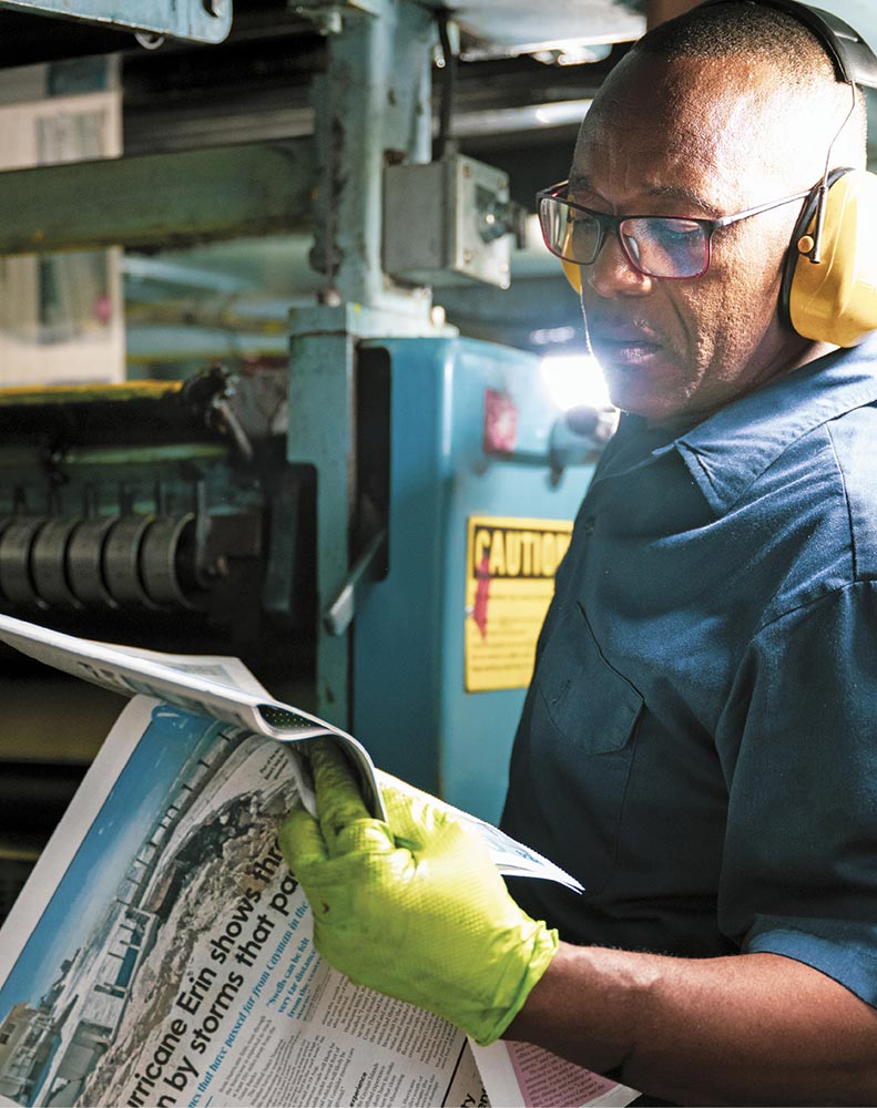 Proud of our printing press - Cayman Compass