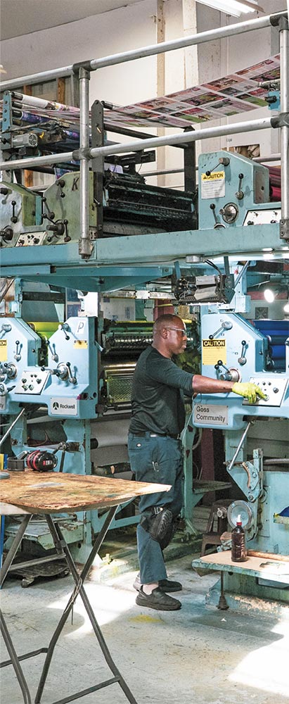 Proud of our printing press - Cayman Compass